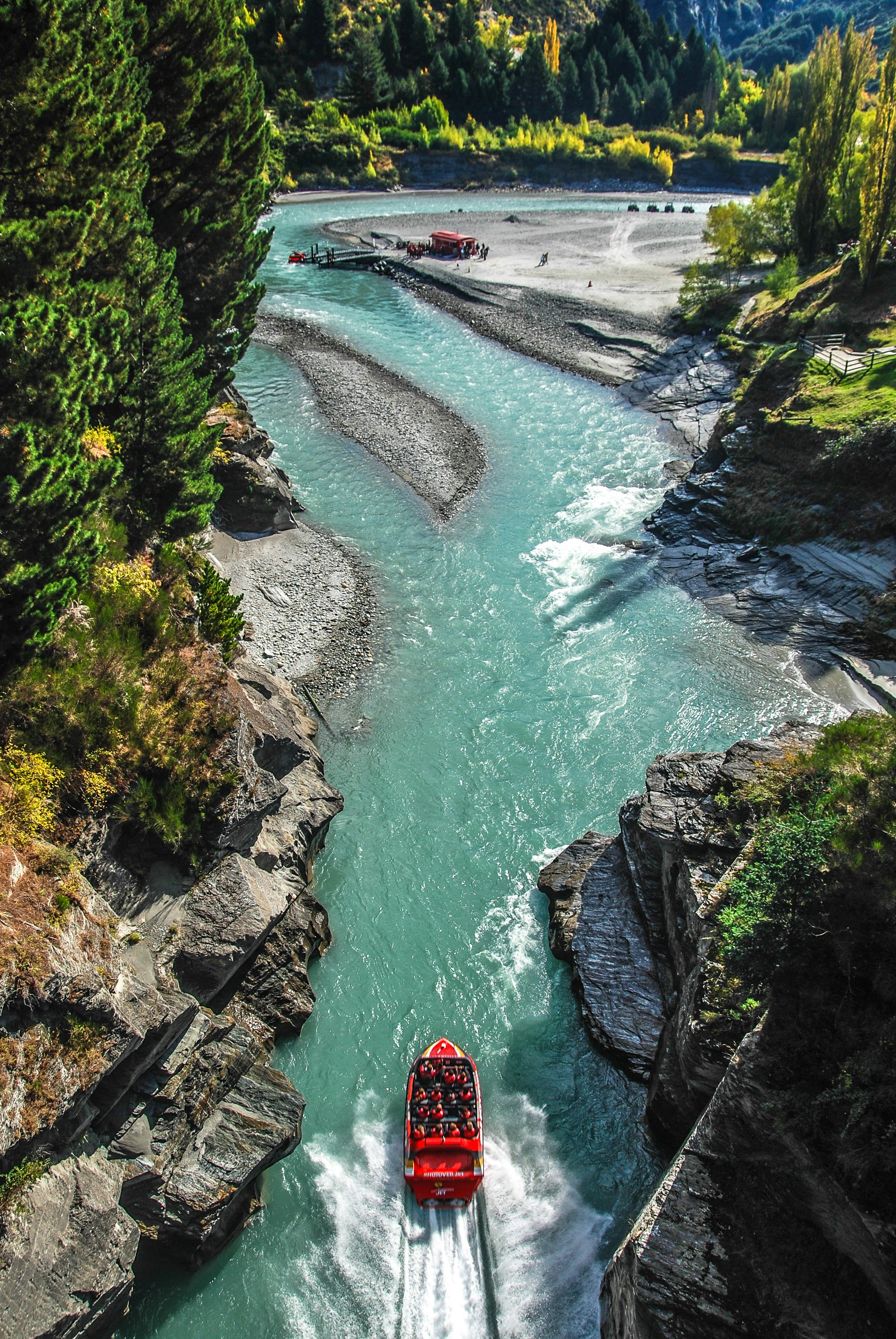 Red Raft Carves a Turquoise Gorge