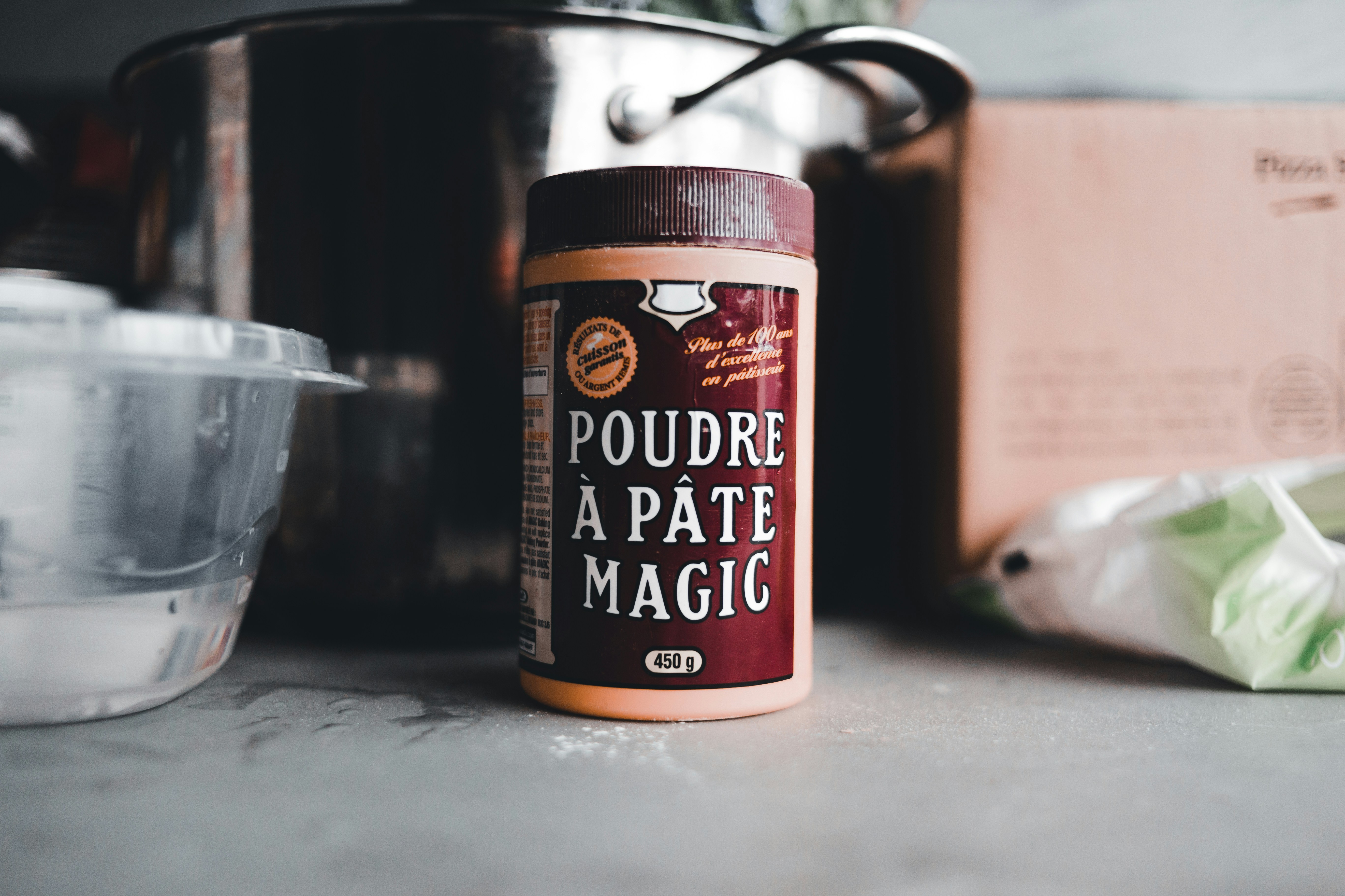 A bottle of pate magic sitting on a counter photo – Free Cup Image on ...