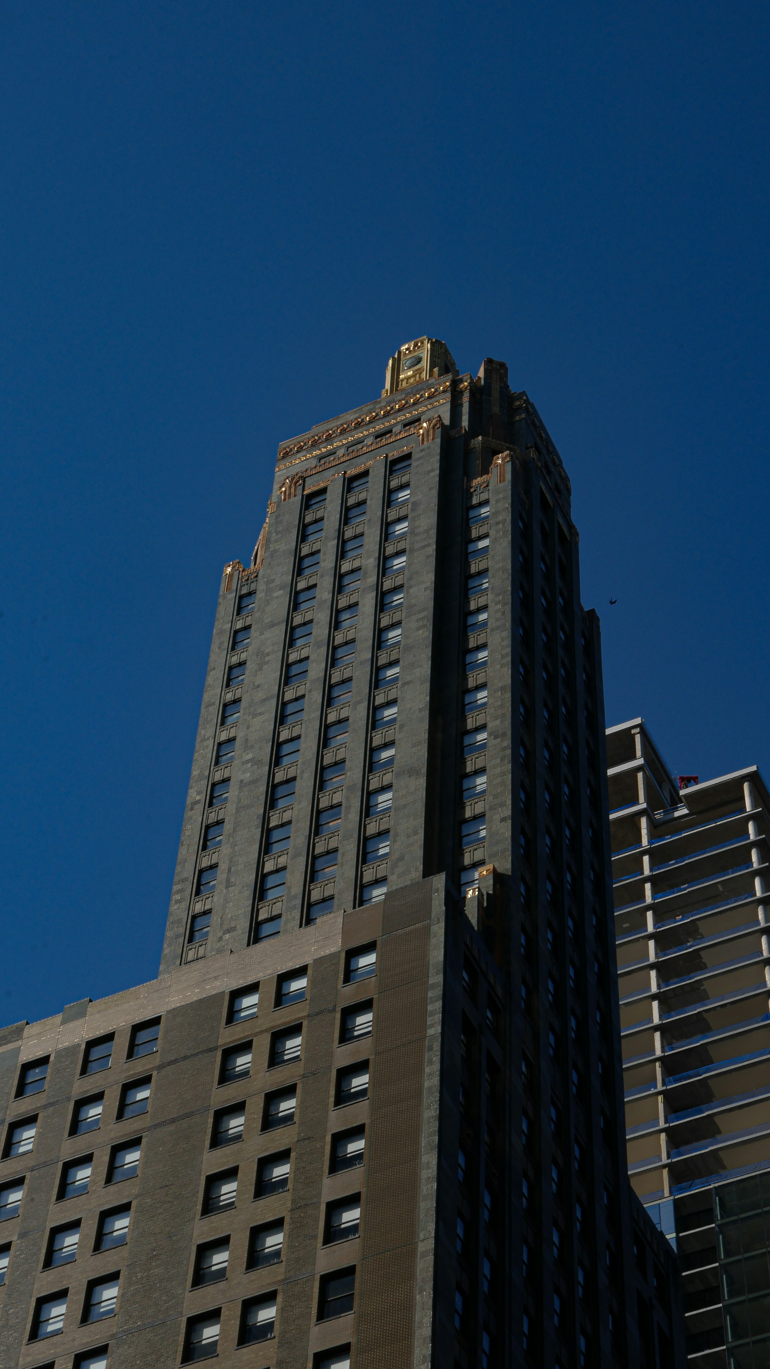 a tall building with a clock on the top of itDylan LaPierre