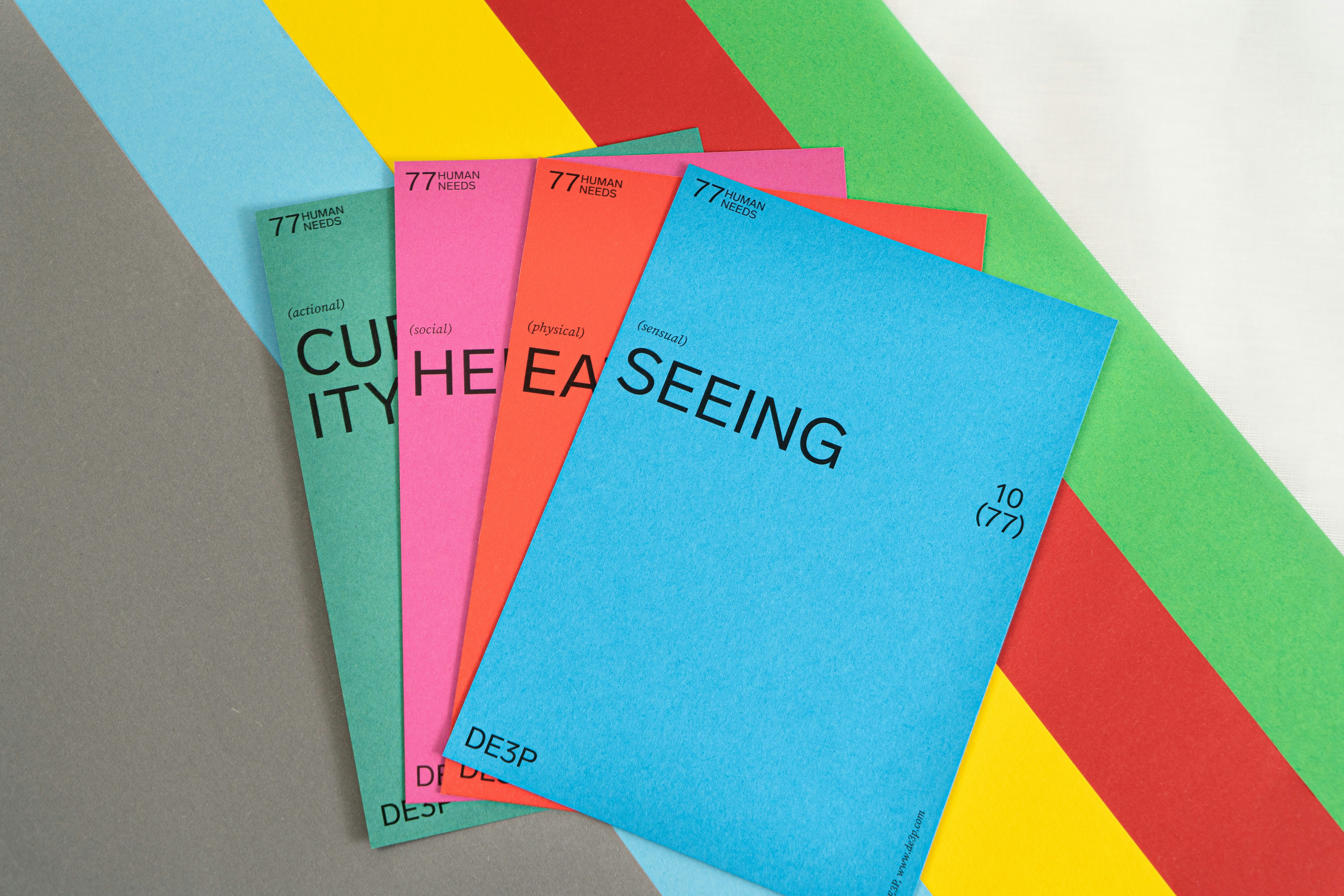 A pile of colorful papers sitting on top of each other photo – Free ...