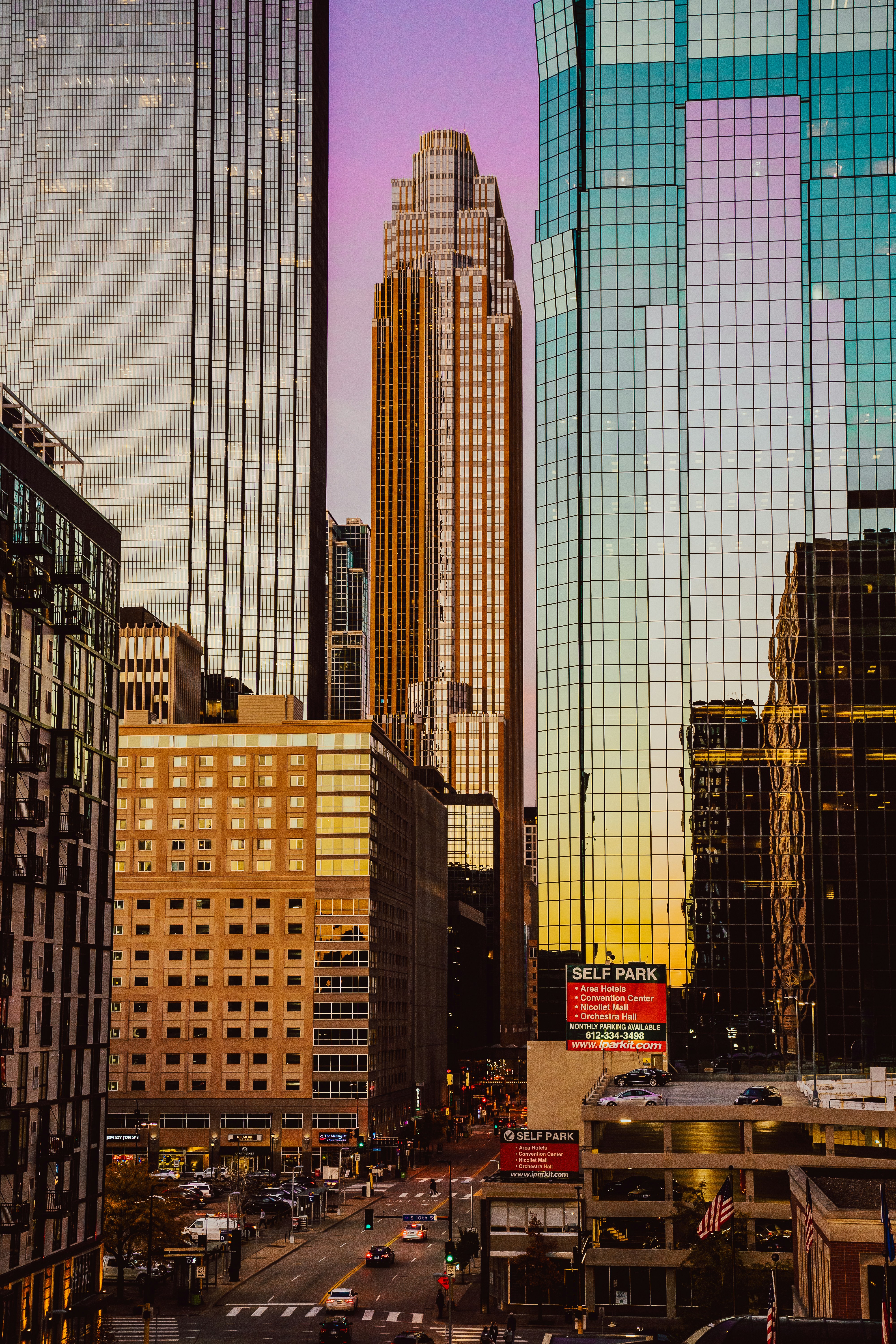 A city street filled with lots of tall buildings photo – Free ...
