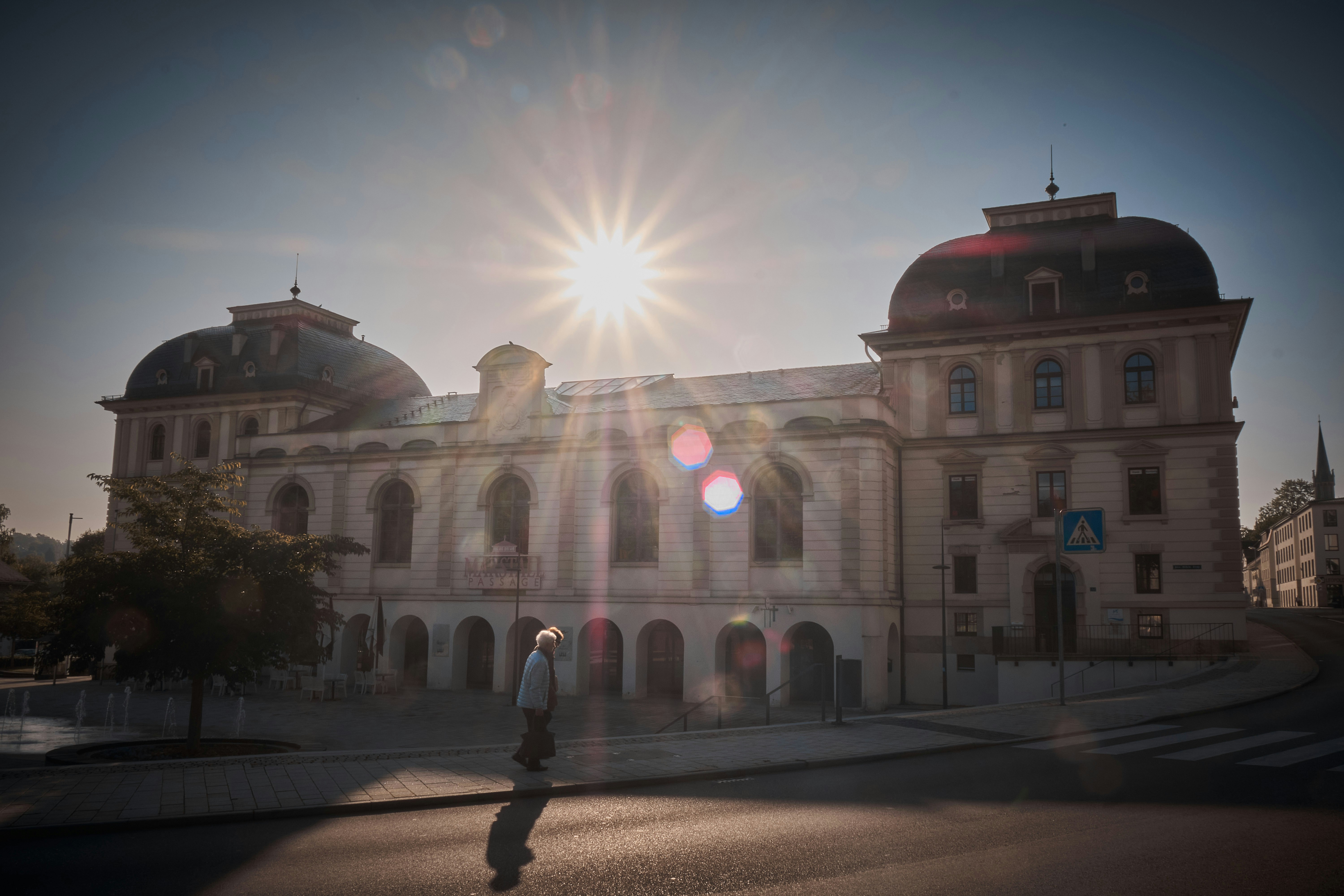 Sunburst Over Marble Arcades: A Quiet City Morning