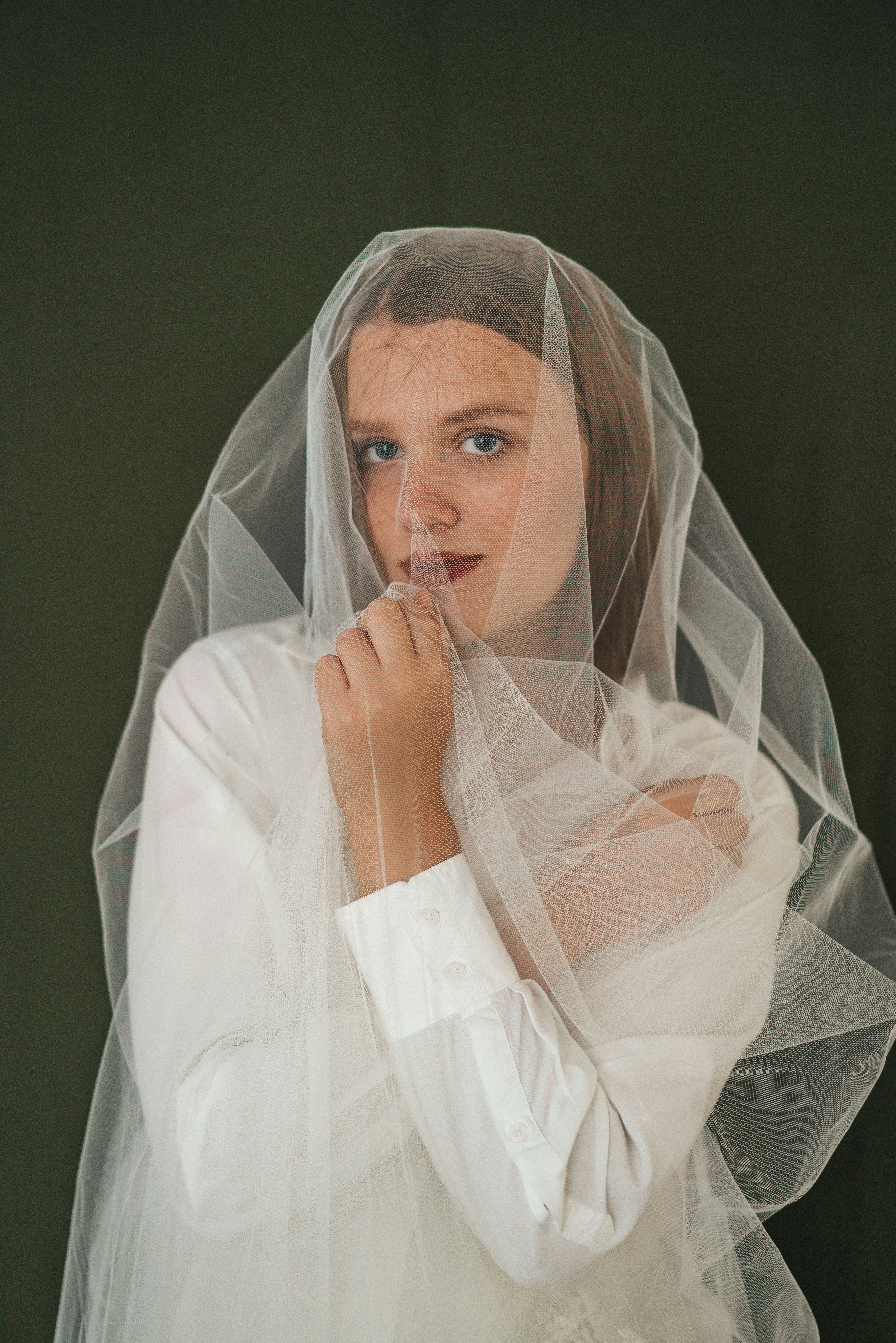 A woman in a veil is posing for a picture photo – Free Fashion Image on ...