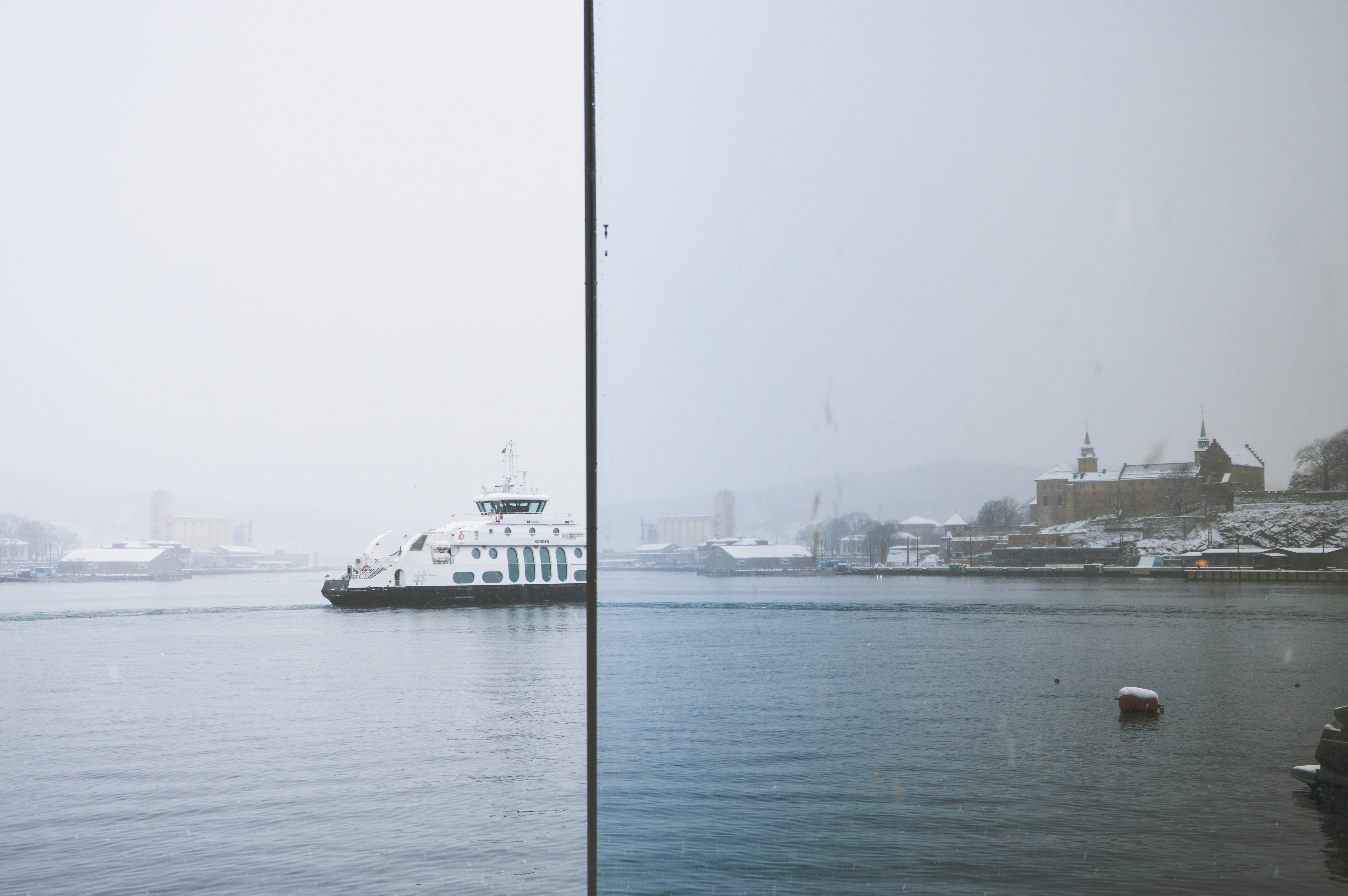 Split-Window Ferry: A Quiet Harbor Through a Fractured View