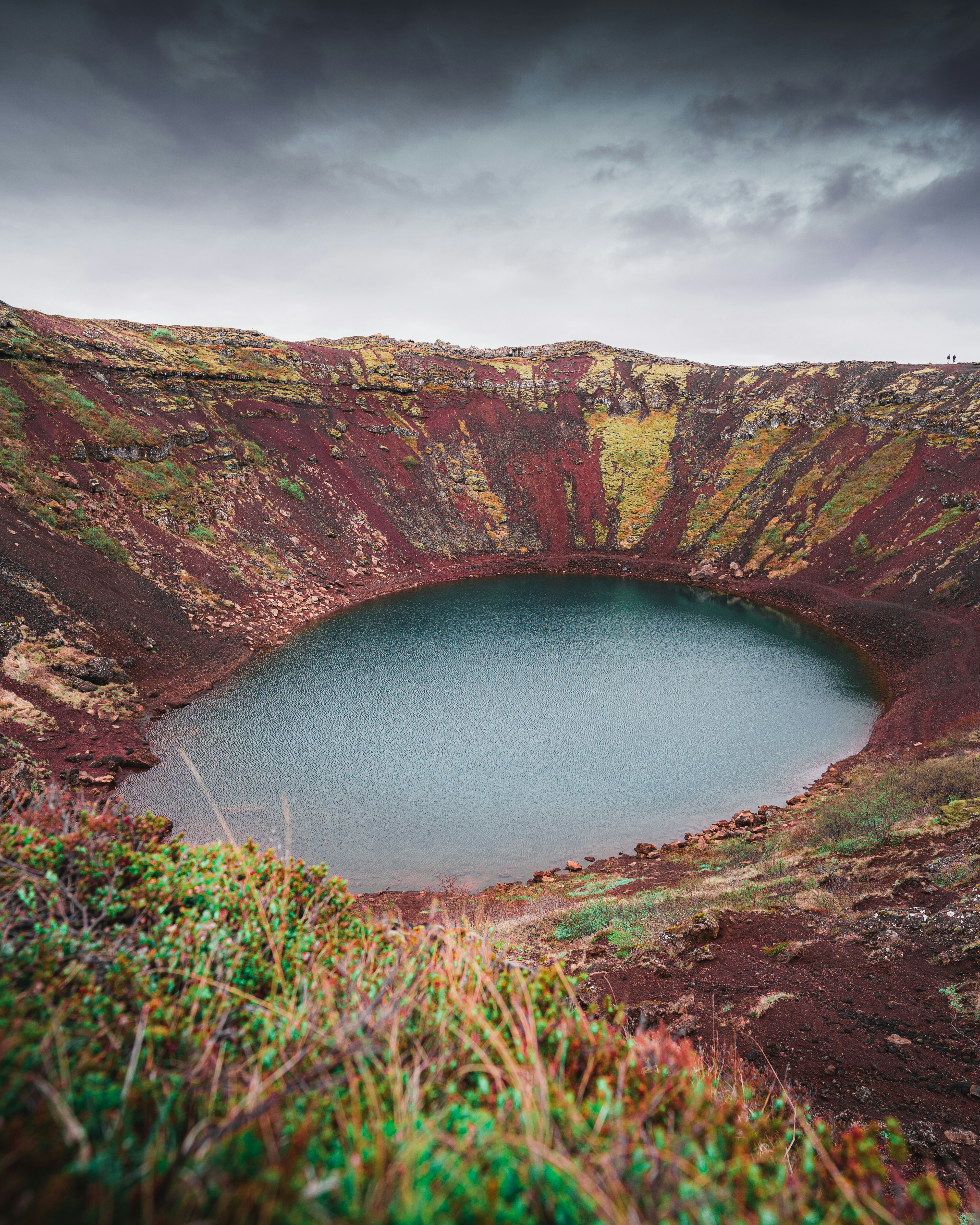 Caldera Heart: A Serene Pool Within a Rim of Ember Rock