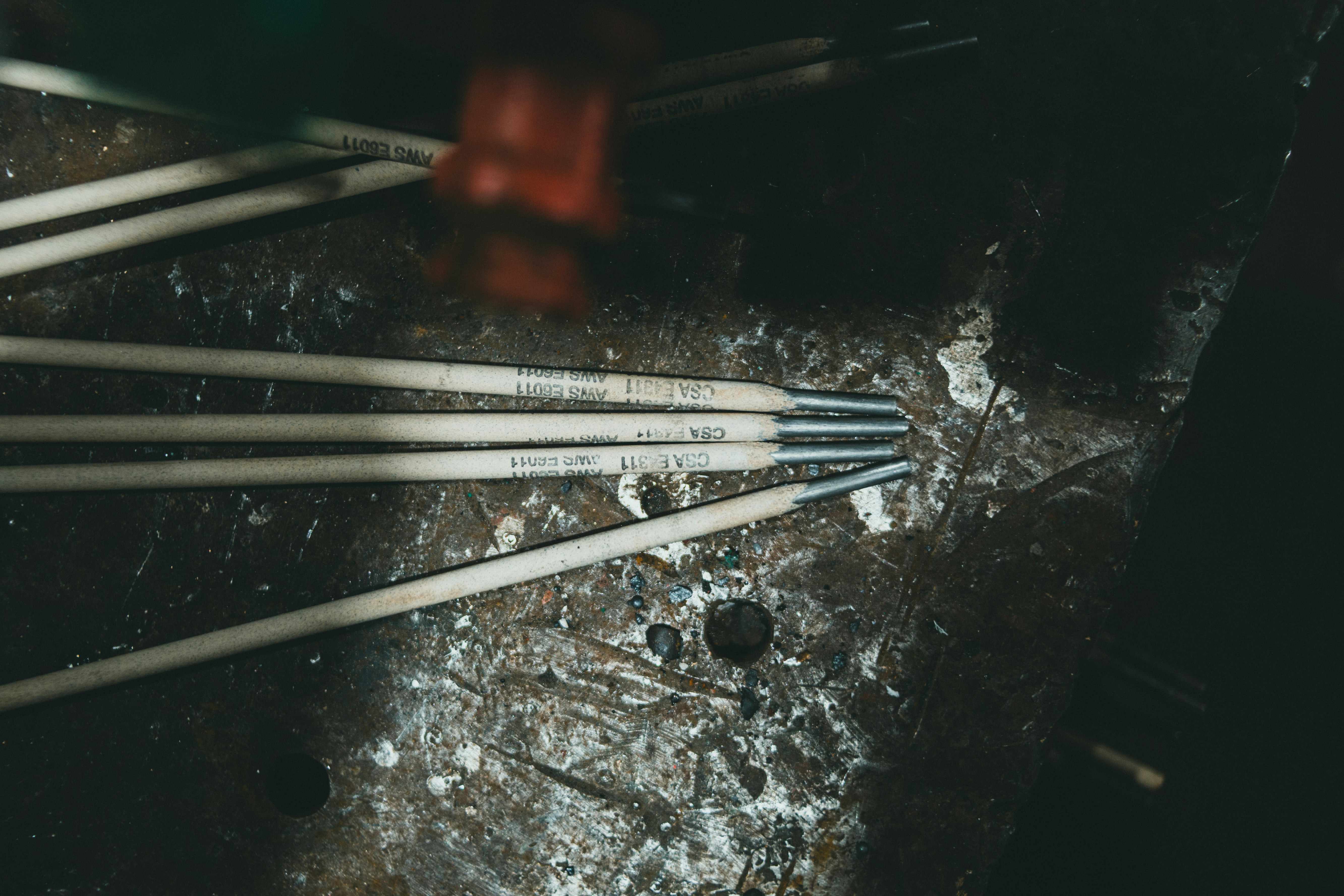 a bunch of drumsticks sitting on top of a table