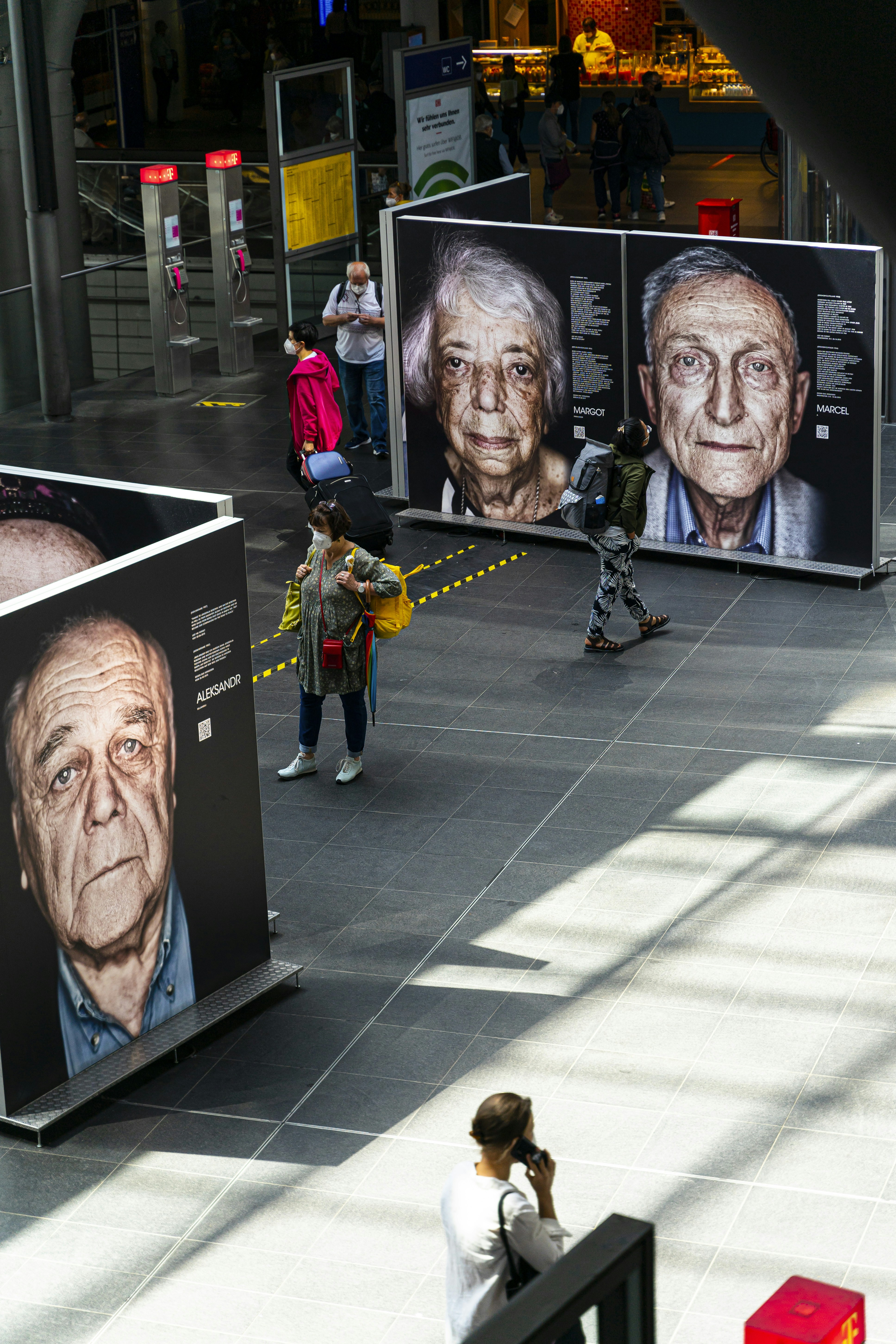 Faces in Focus: A Gallery of Portrait Panels at the Transit Atrium