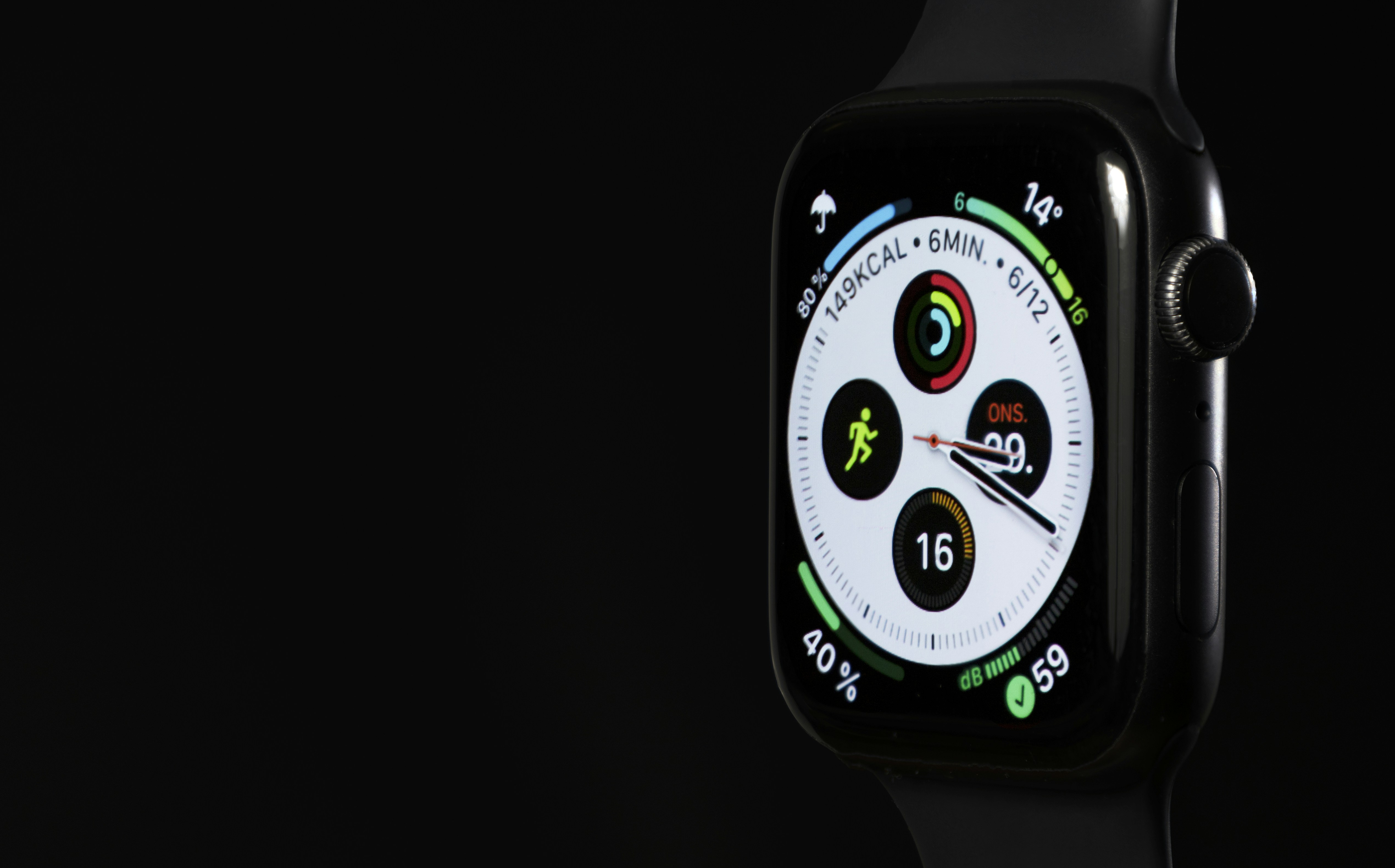 A close up of an apple watch on a black background photo – Free ...