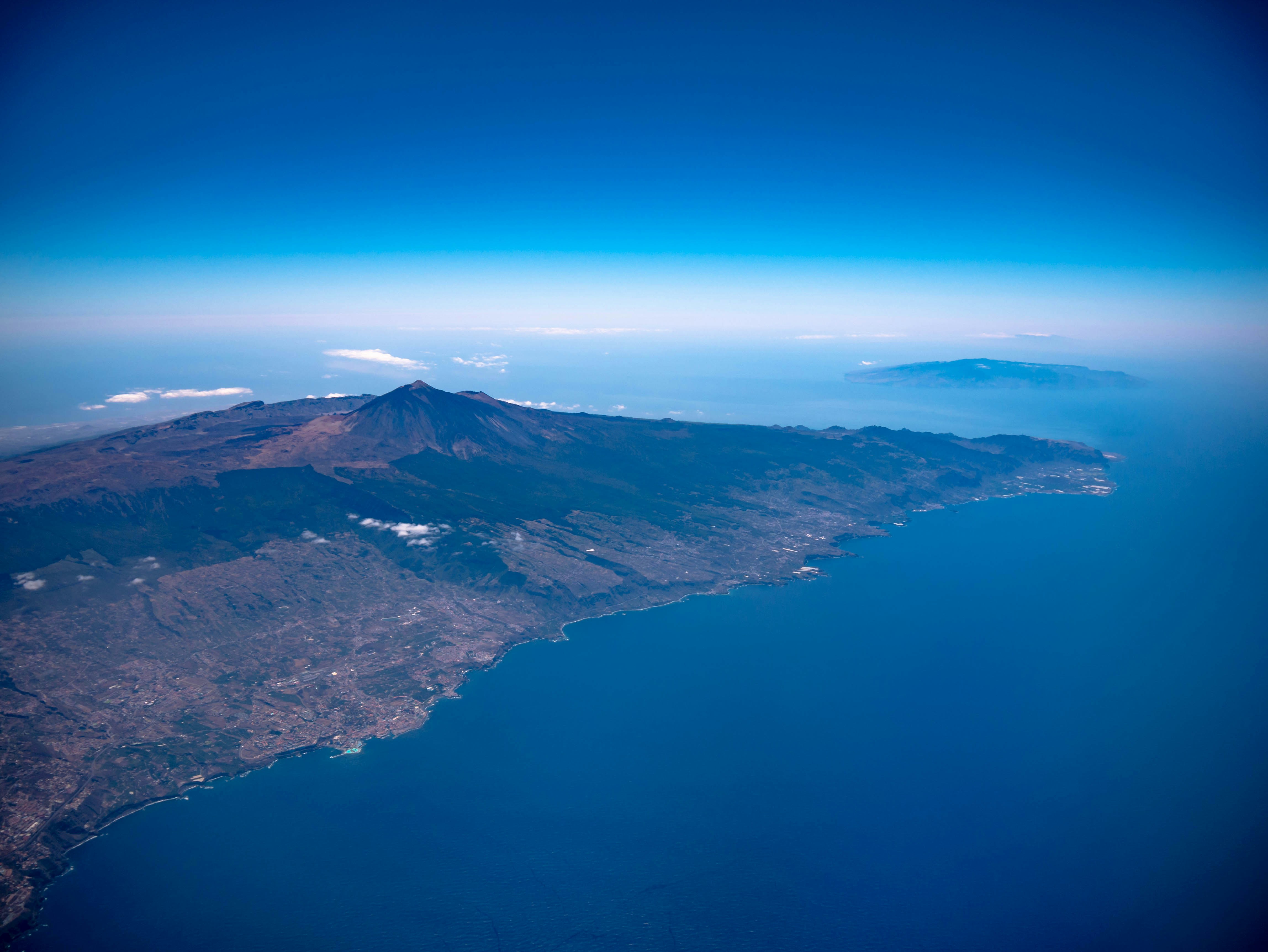 Earthbound Summit: Aerial View of Coastal Volcano Ridge from Above