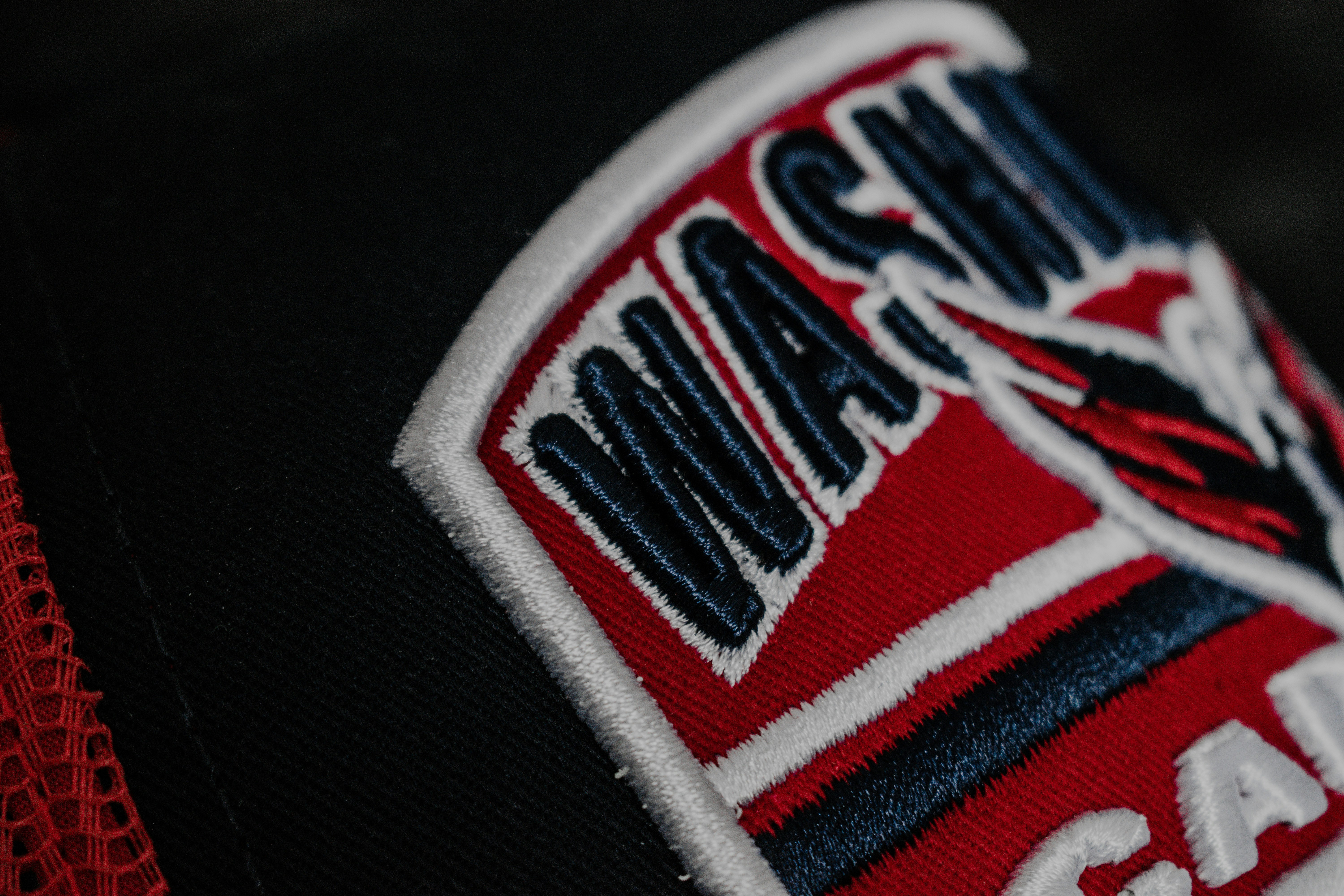 A close up of a red and black baseball cap photo – Free Washington dc ...