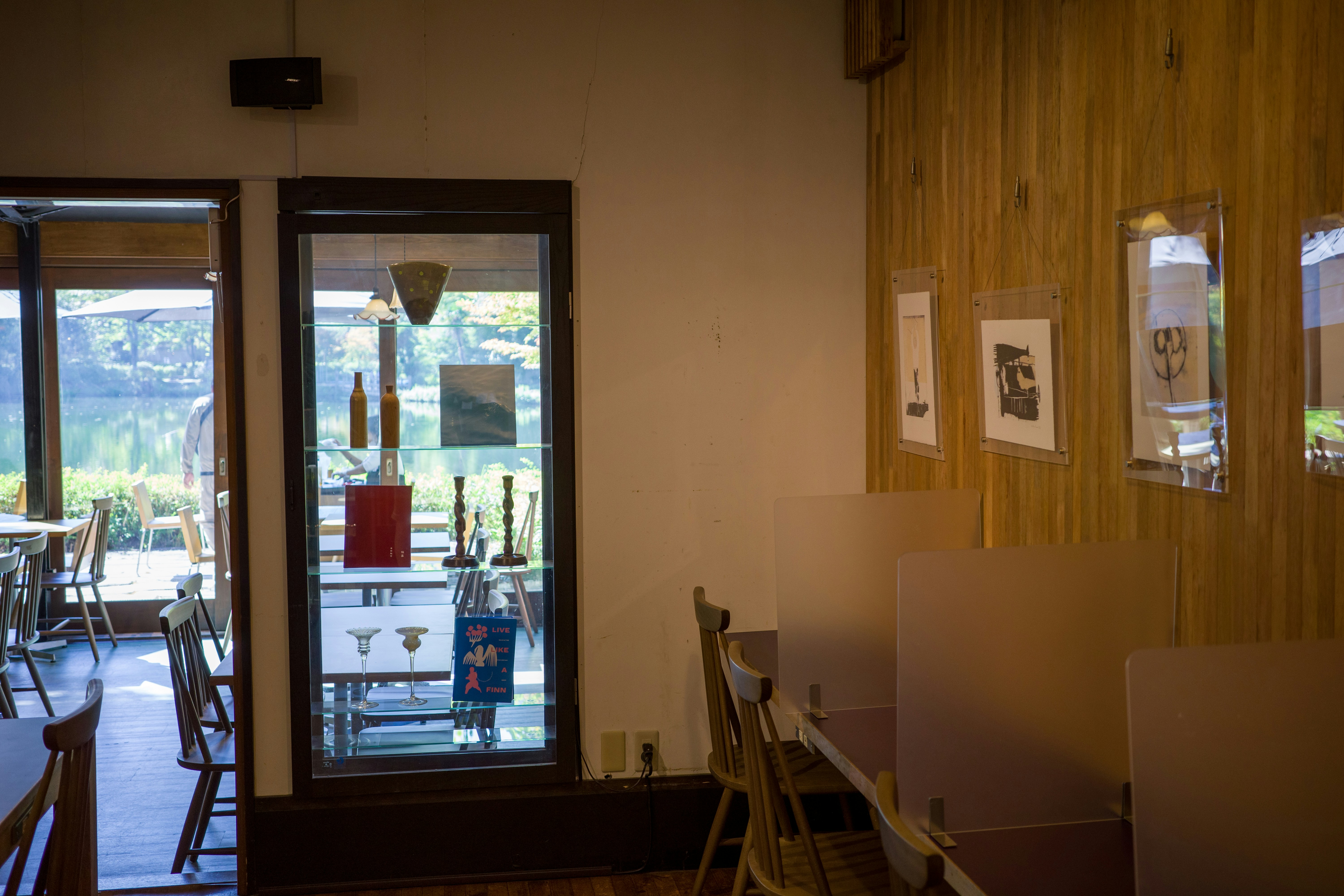 a view of a restaurant through a glass door