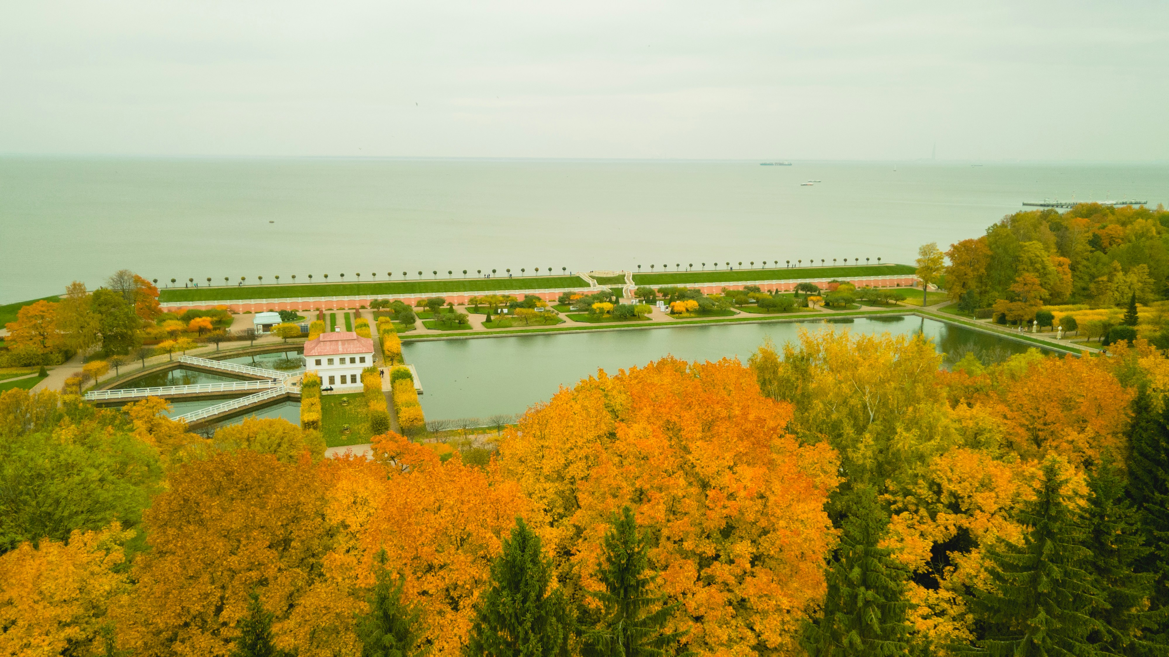 Autumn Aquatics: Riverside Park Amid Golden Canopy