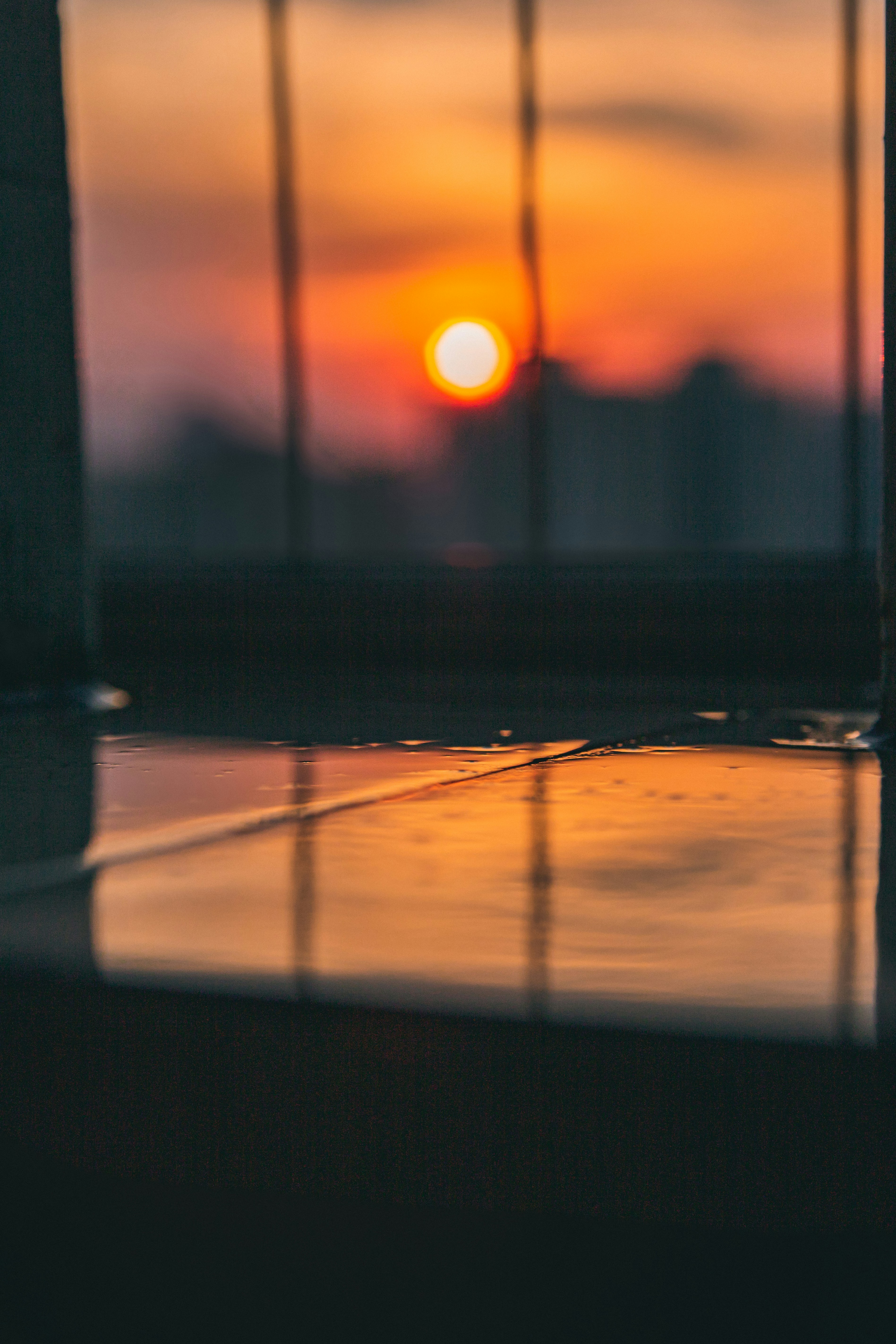 A view of a sunset through a window photo – Free Flooring Image on Unsplash