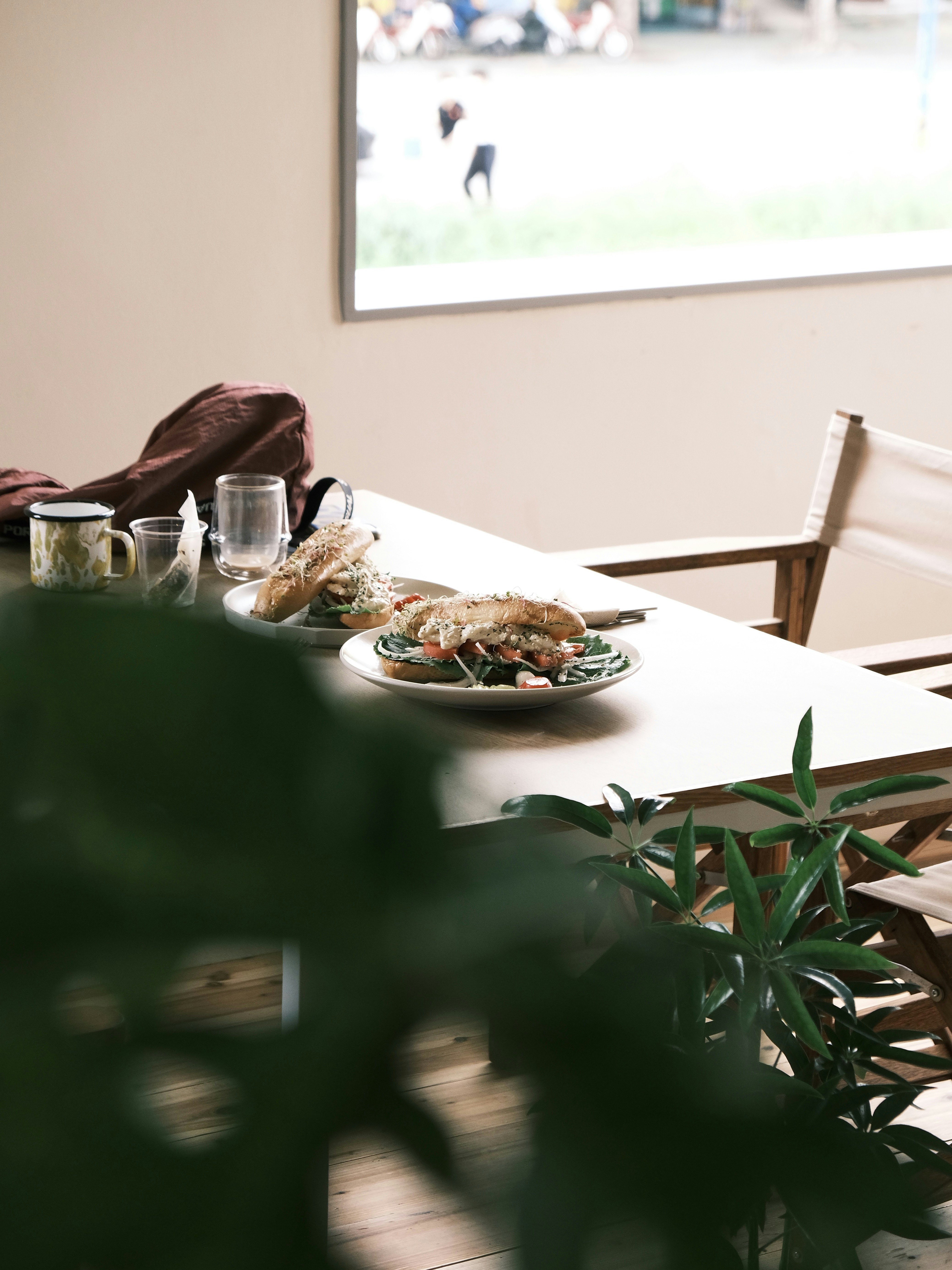 Tableside Feast: Sandwiches and Tea in Quiet Sunlight