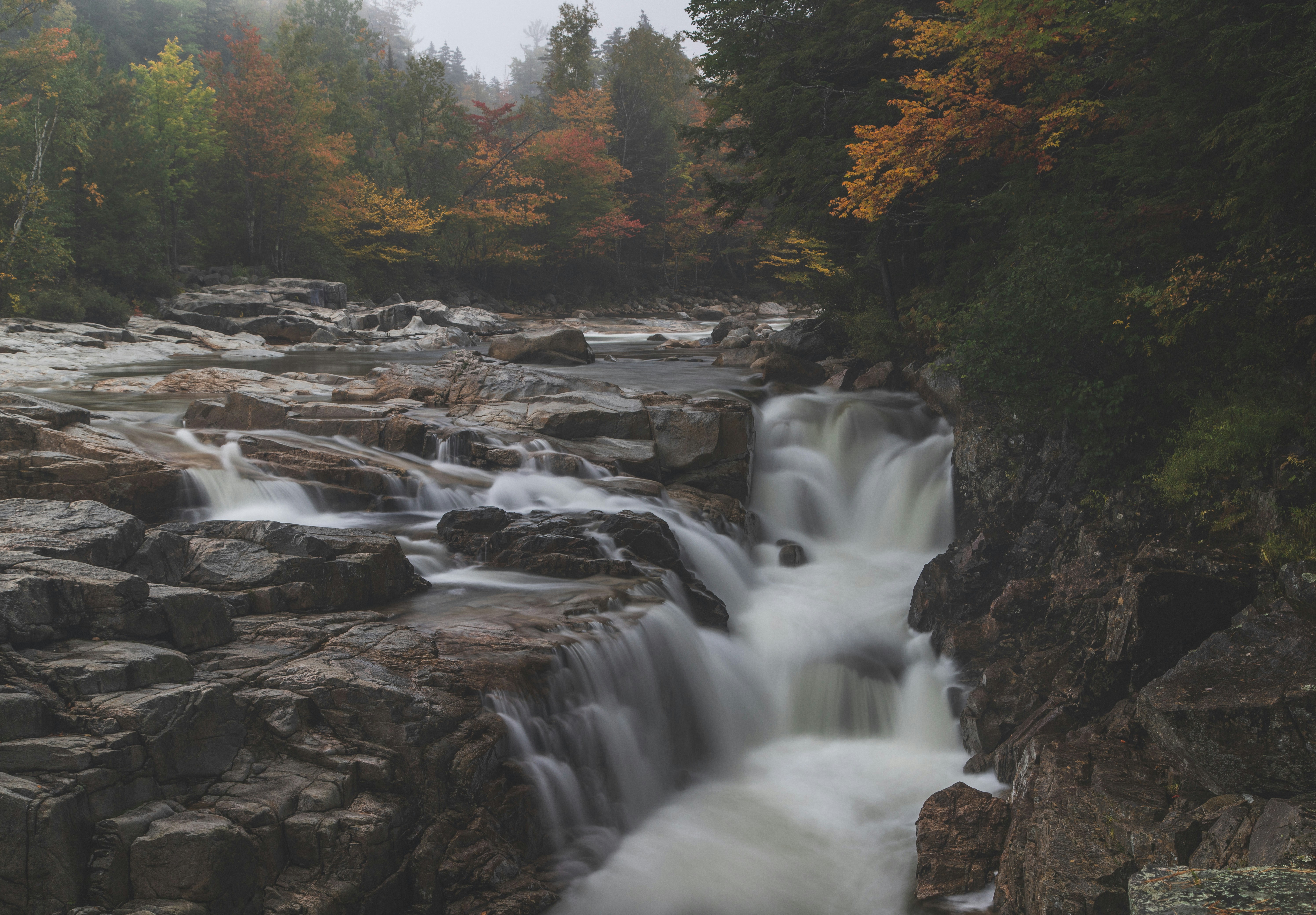 Autumn Cascade Over Granite Steps