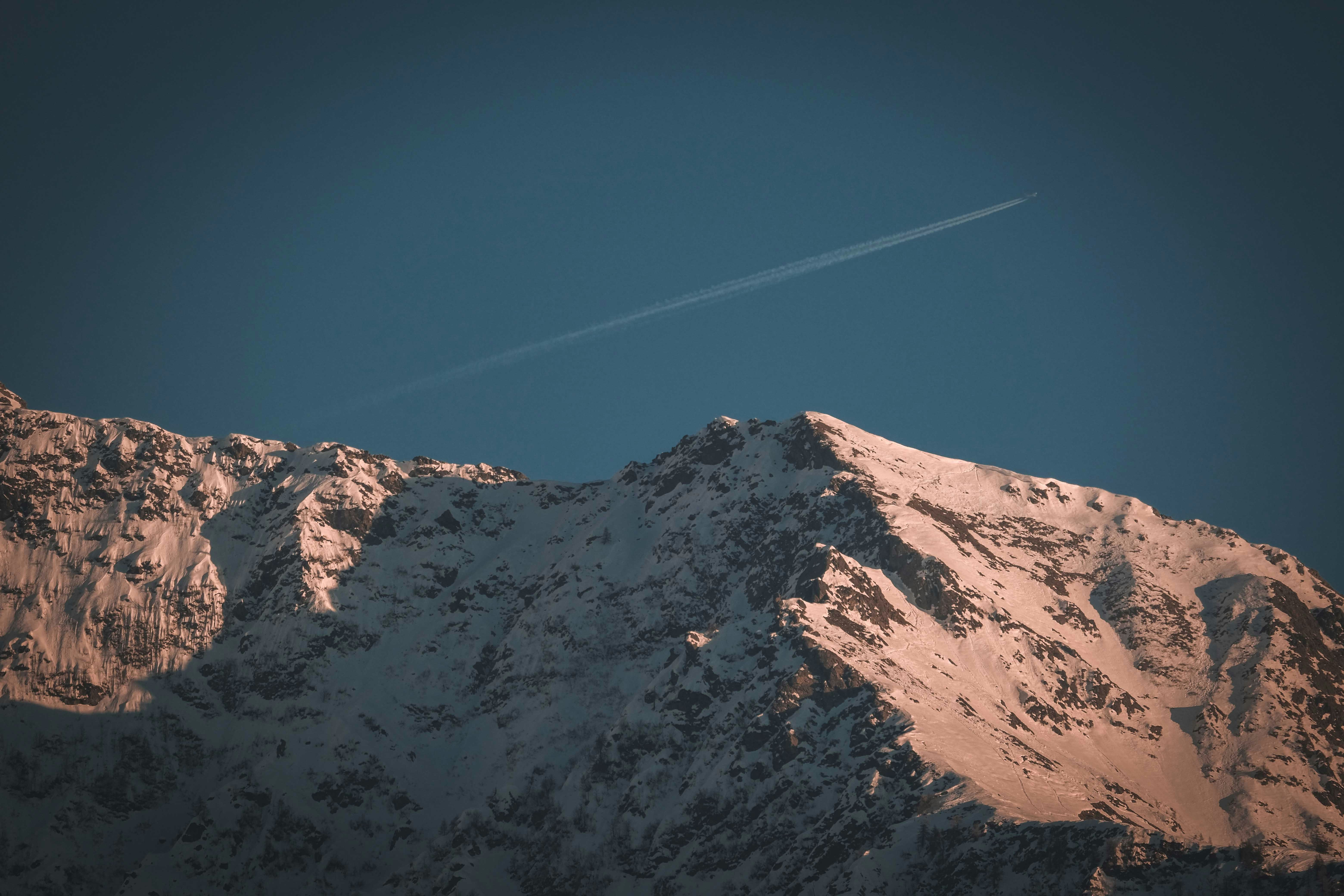 Alpine Crest Under a Battery of Indigo Skies