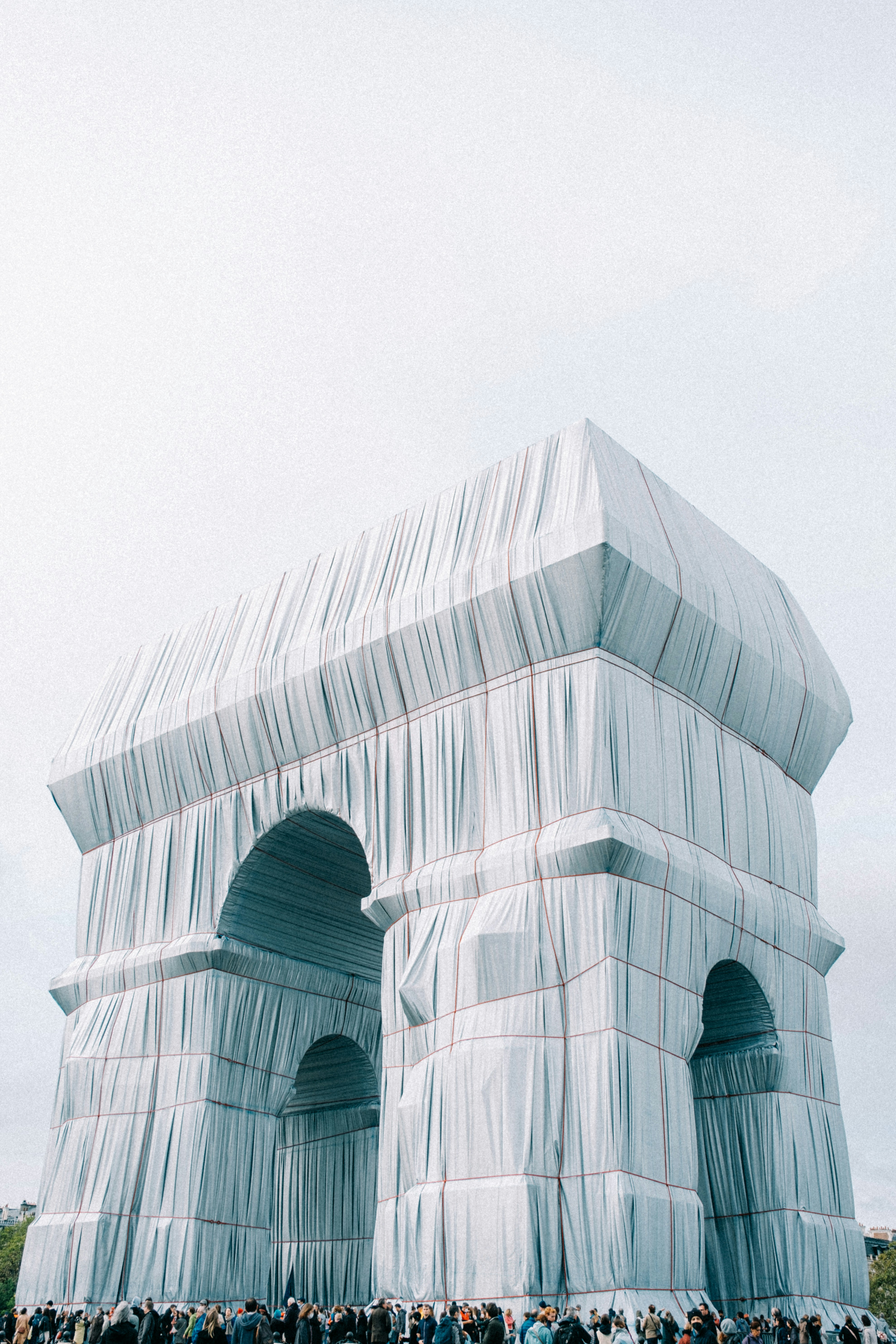 a group of people standing in front of a buildingMathias Reding