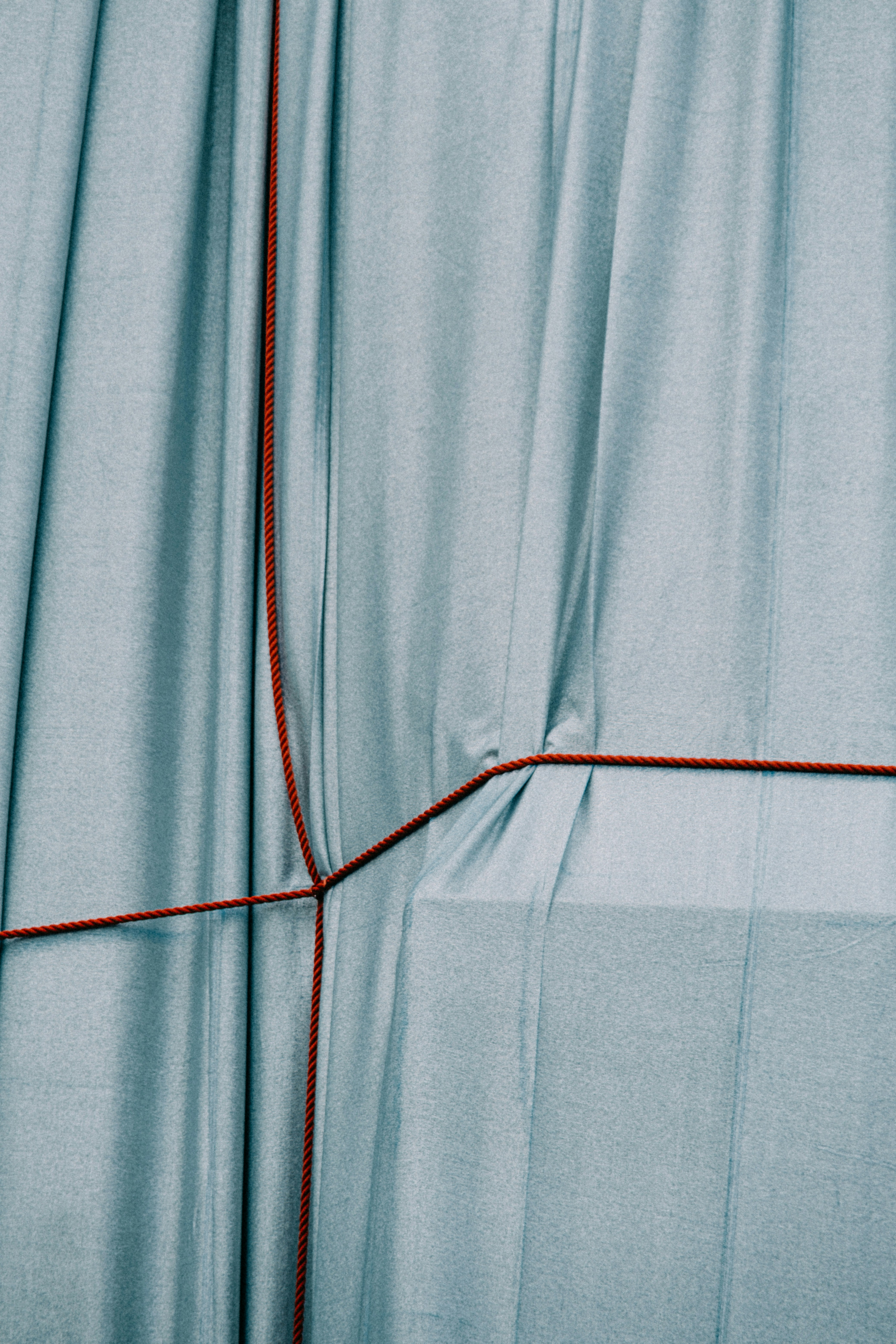 Rope Lines on a Teal Curtain