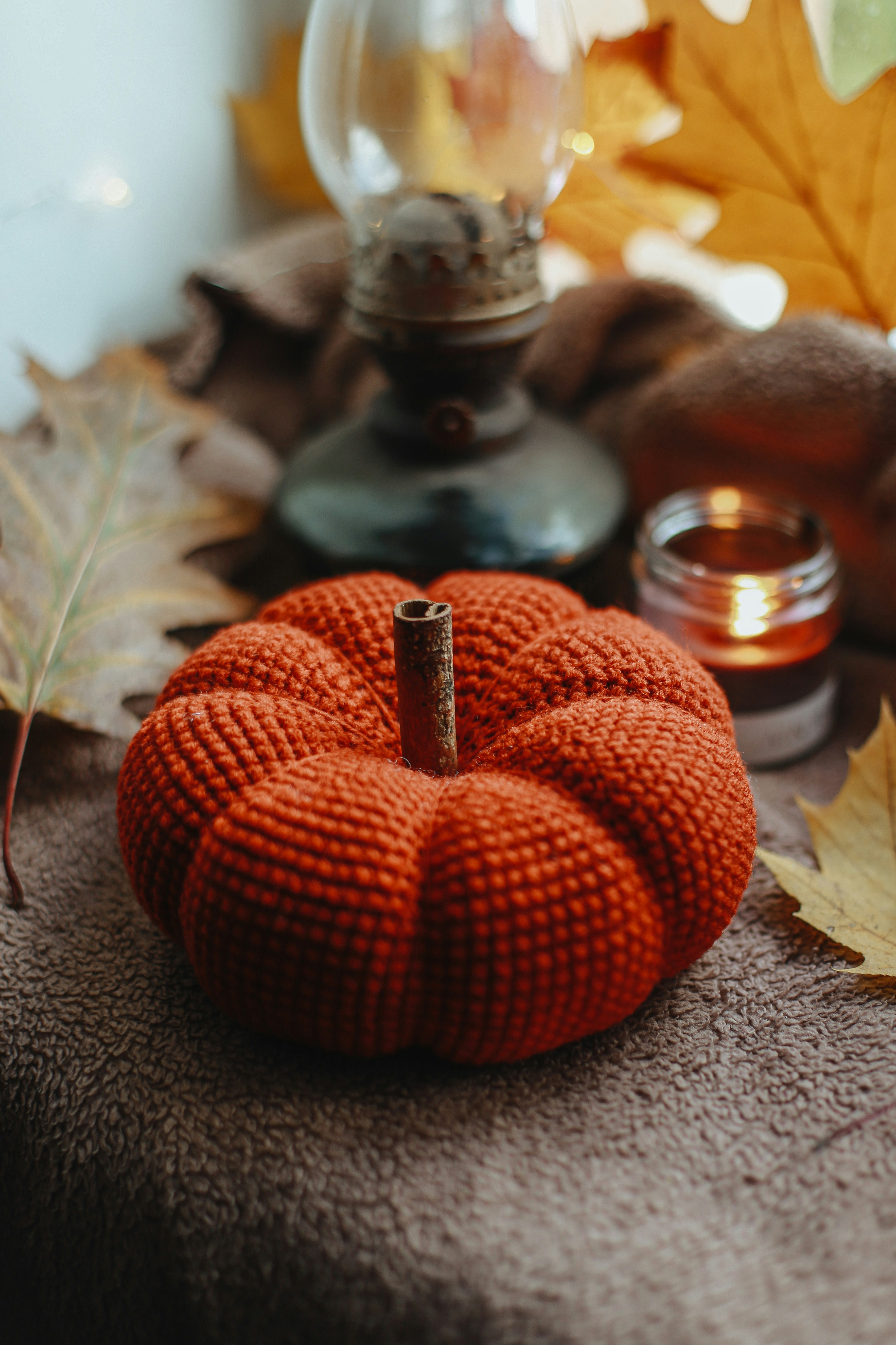 Amber Pumpkin Still Life: A Cozy Fall Moment by the Lantern