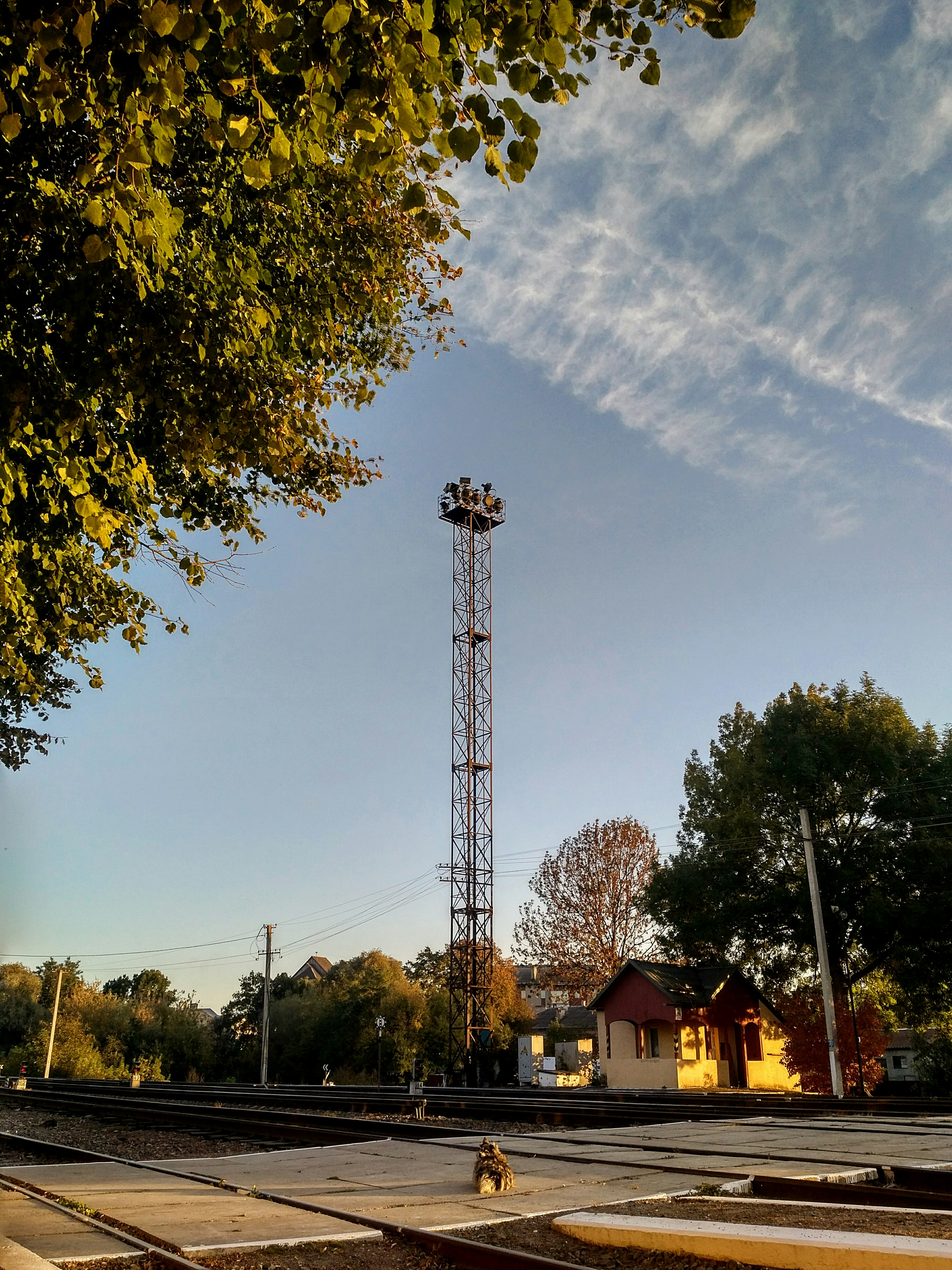 A train track with a tower in the background photo – Free Чернівецька ...