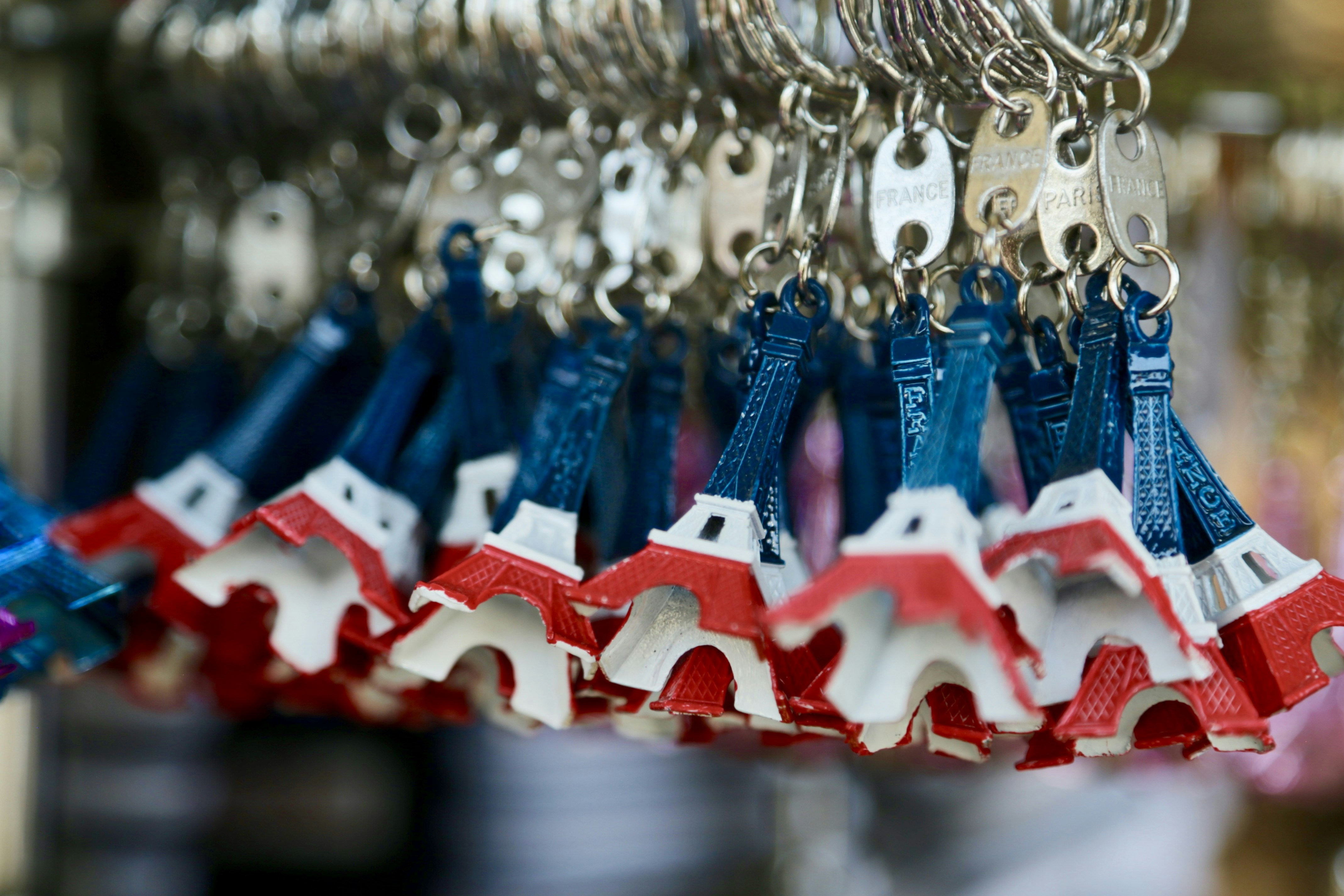 Keys of the Rescue: Red, White, and Blue Miniaturas Hanging in Focus