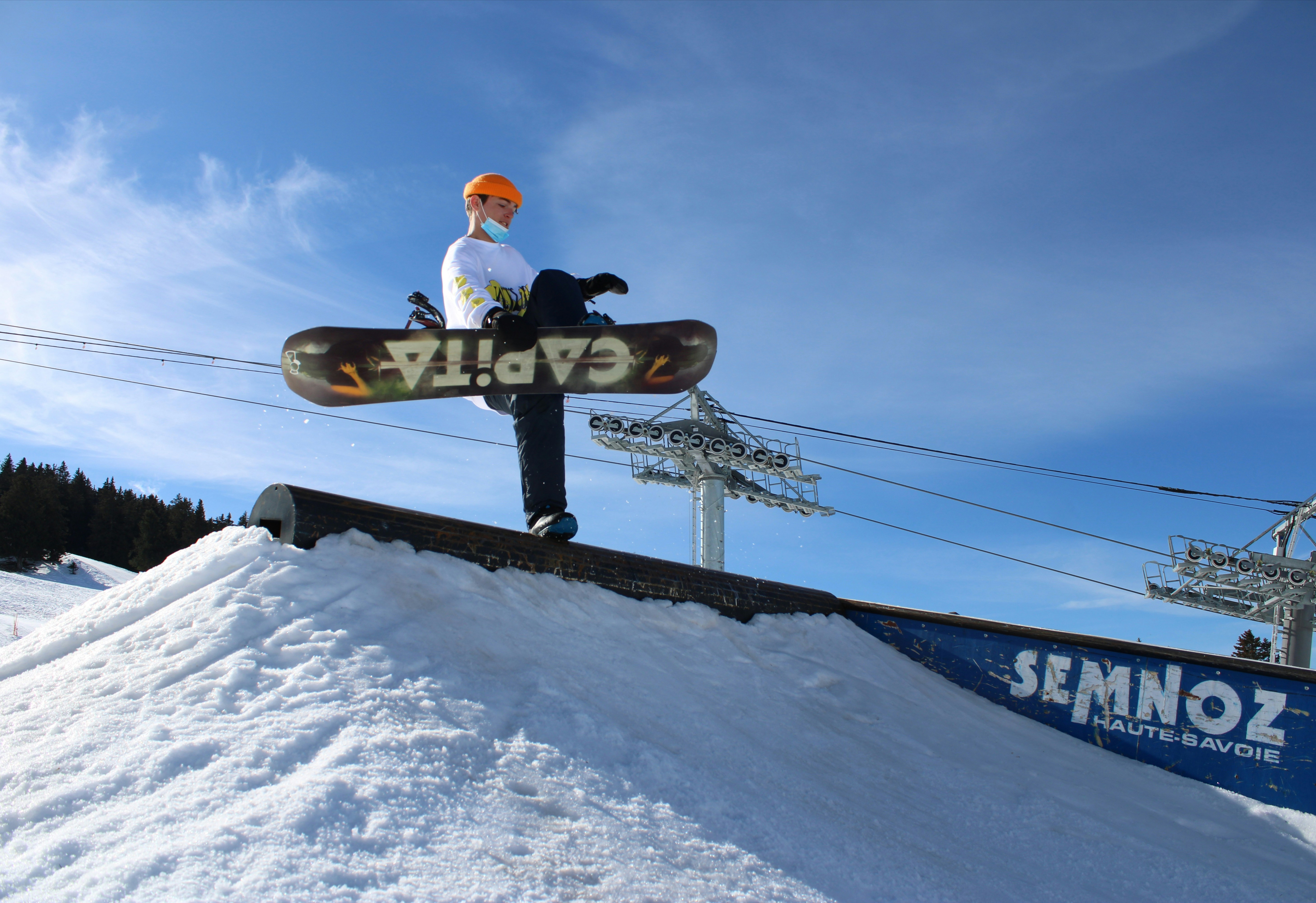 A person on a snowboard on top of a ramp photo – Free France Image on ...