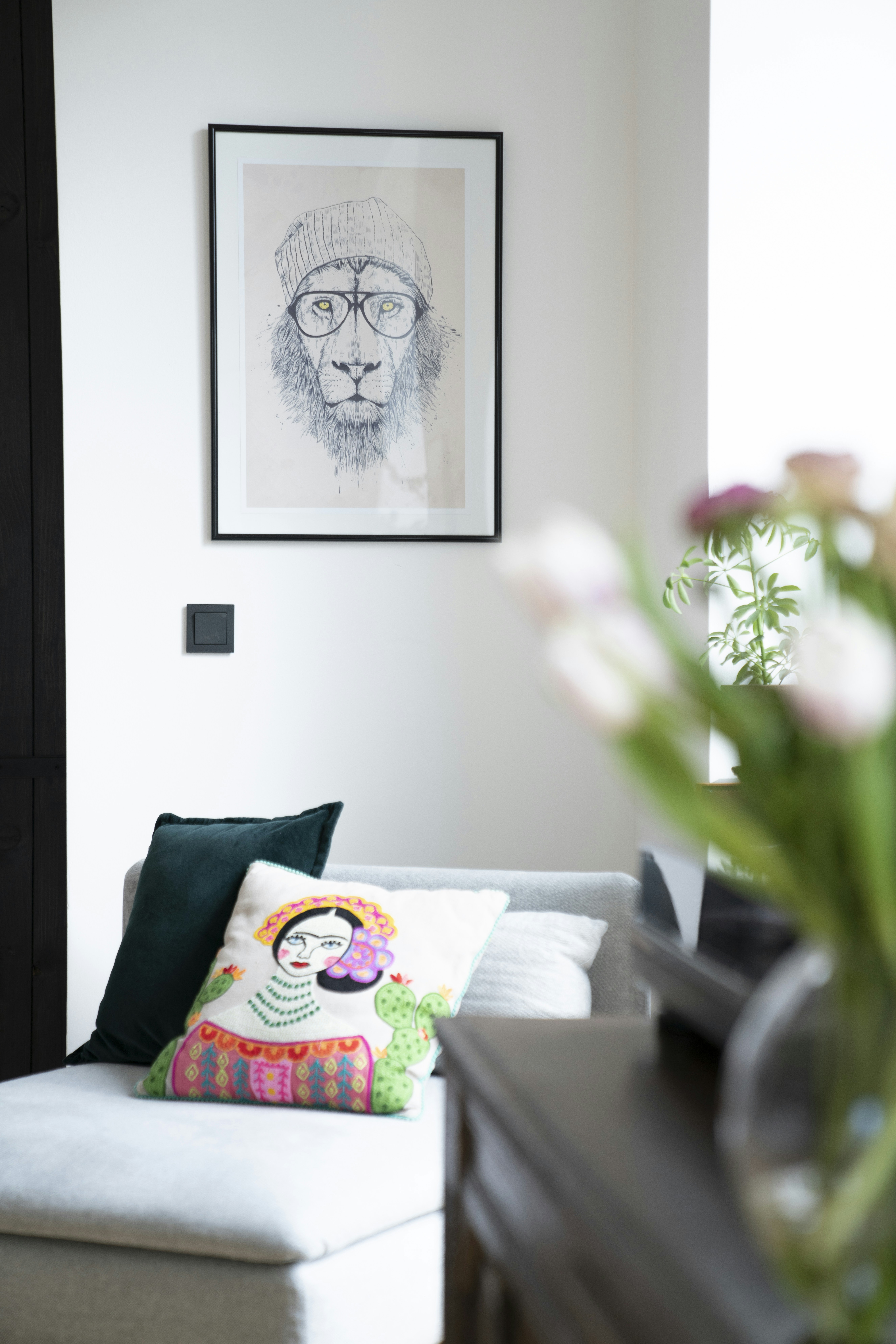 Framed Lion Portrait Over a Cozy Accent Corner