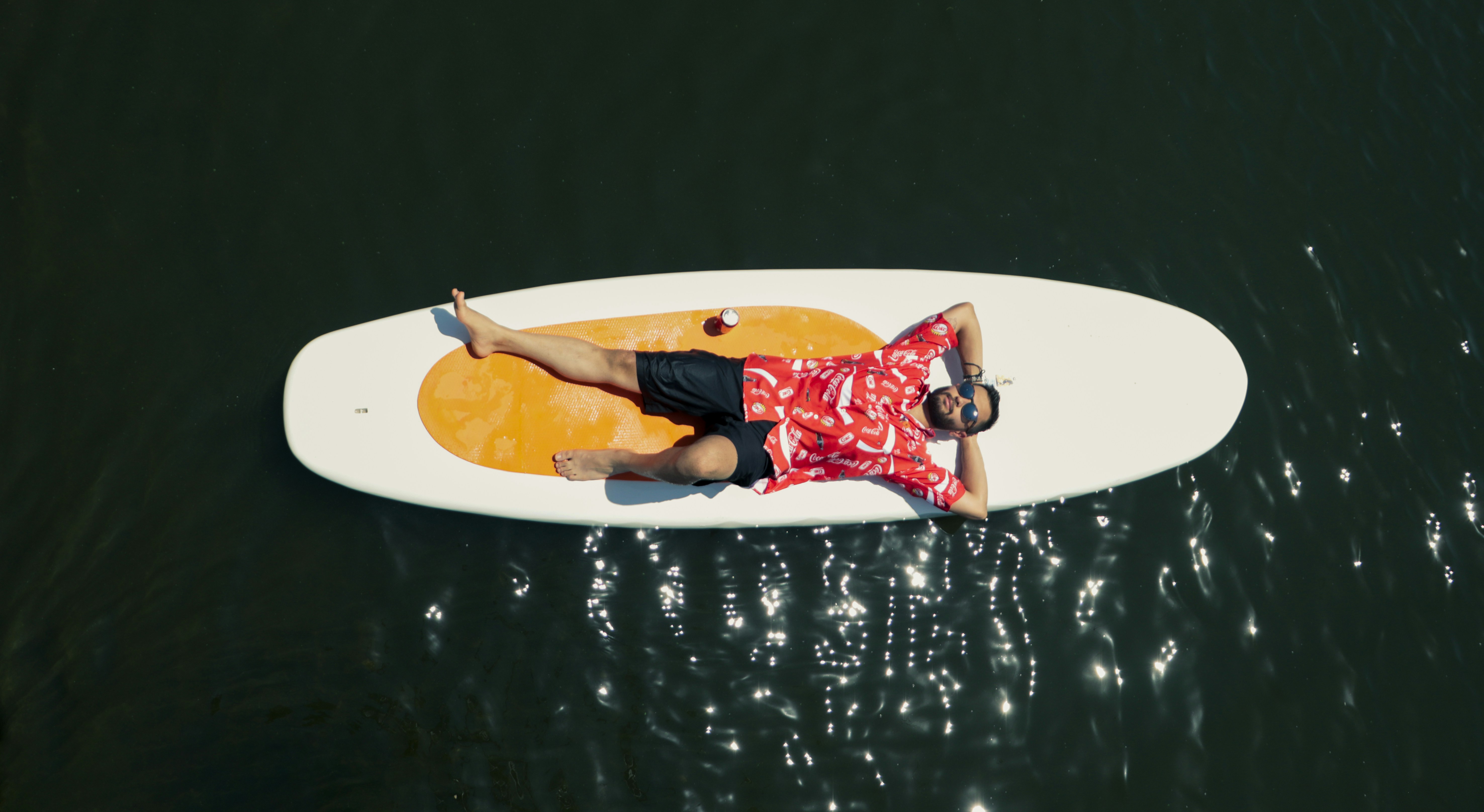 Gliding on a Quiet Sea: Rider Reaches for the Horizon
