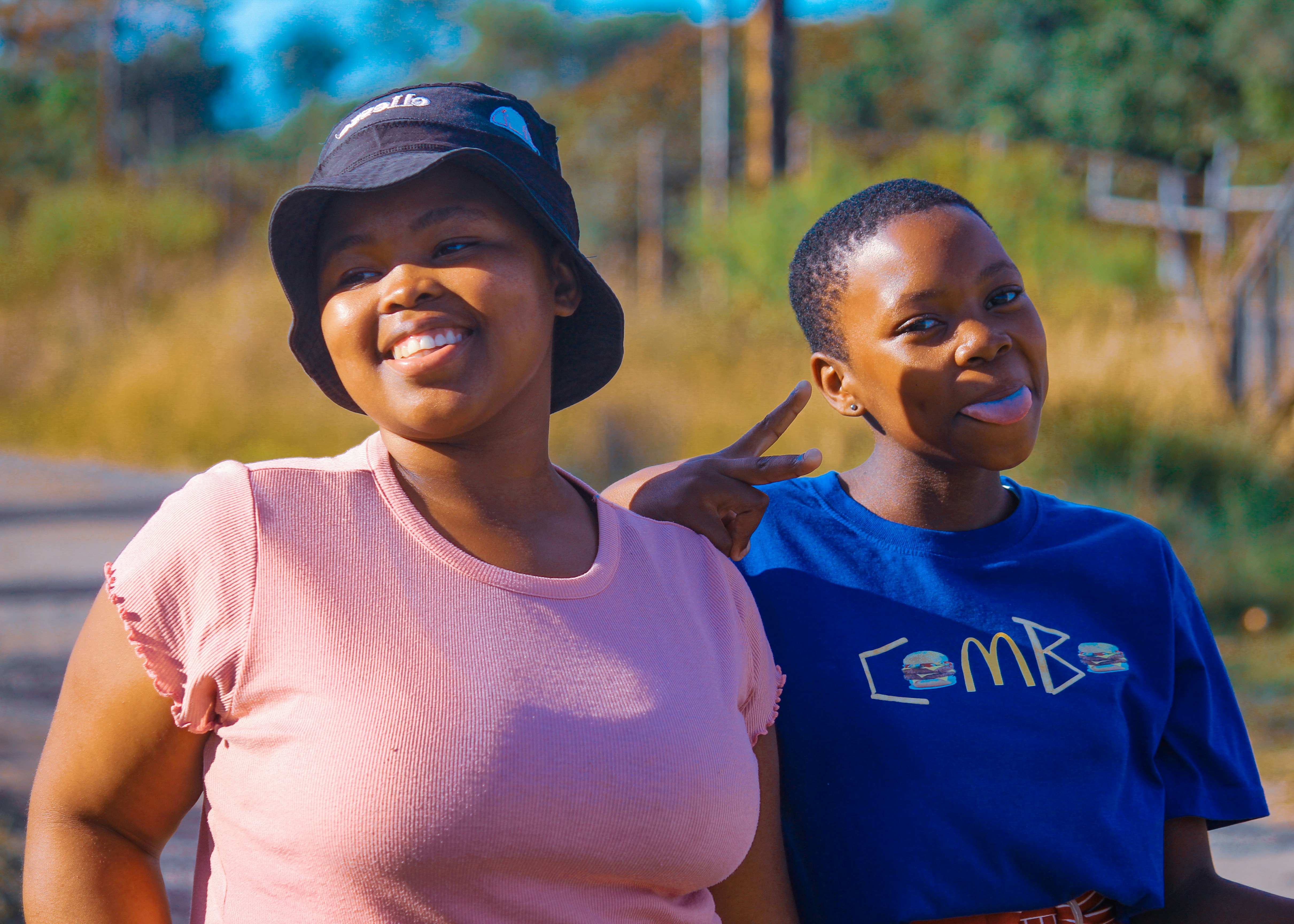 A couple of people standing next to each other photo – Free Groutville ...