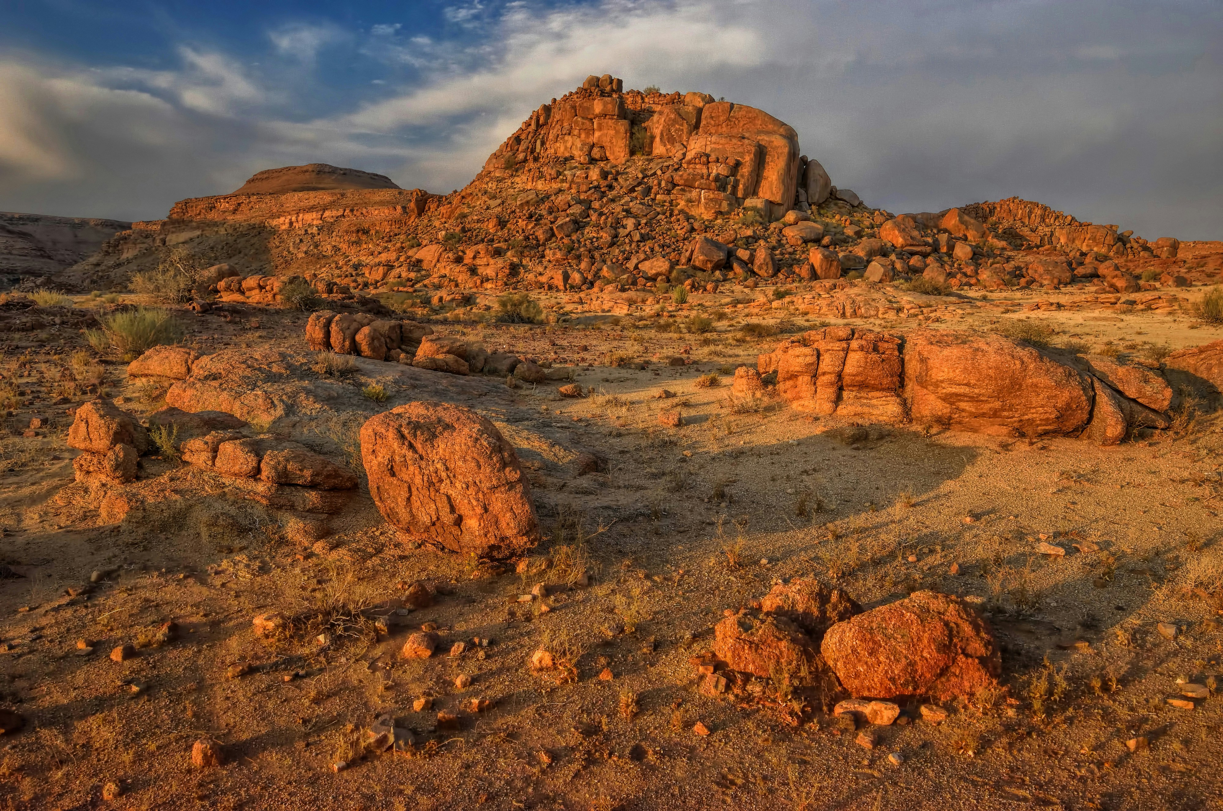 A rocky outcropping in the middle of a desert photo – Free Namibie ...