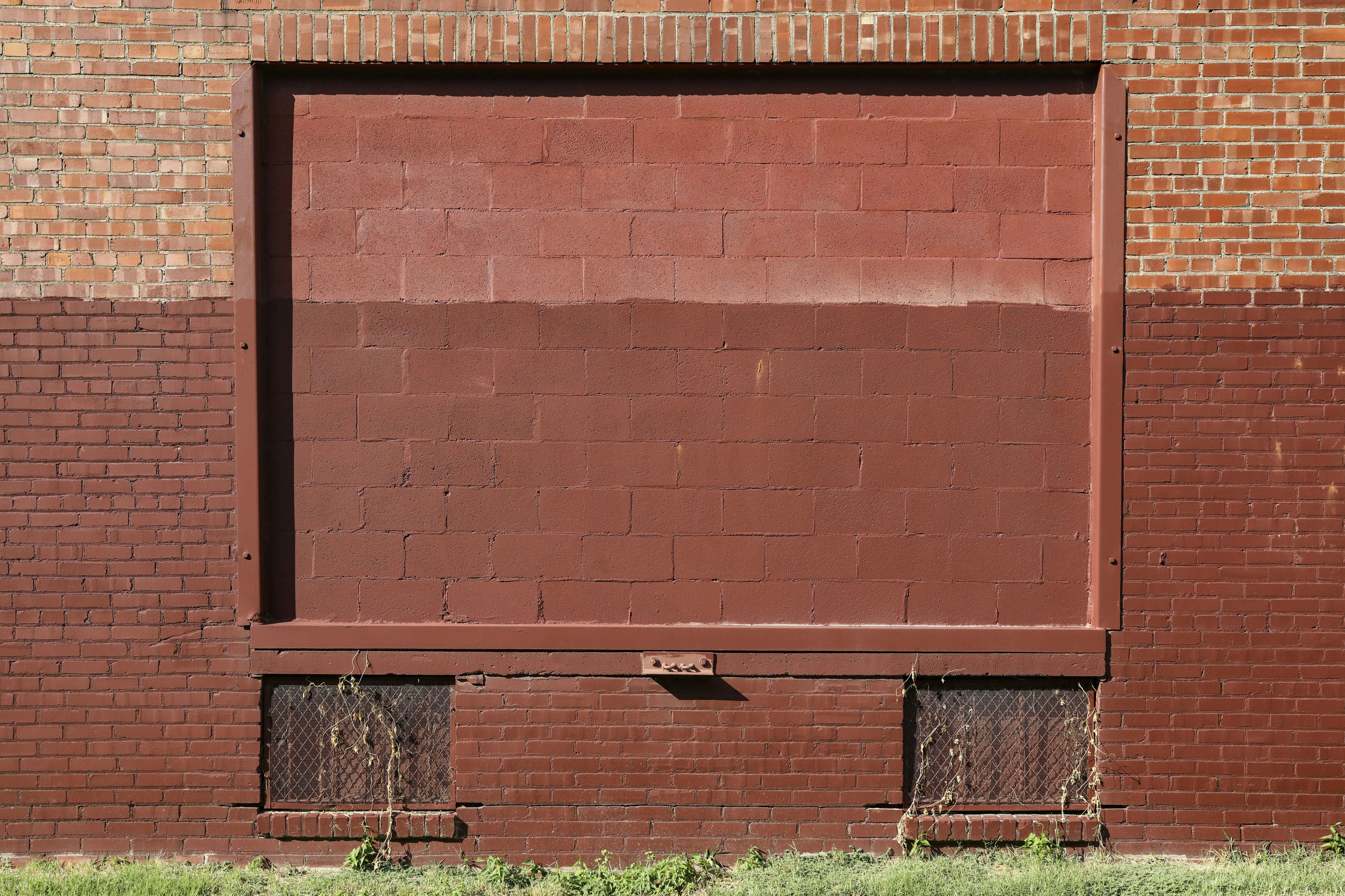 A red brick building with a sign on the side of it photo – Free Tulsa ...