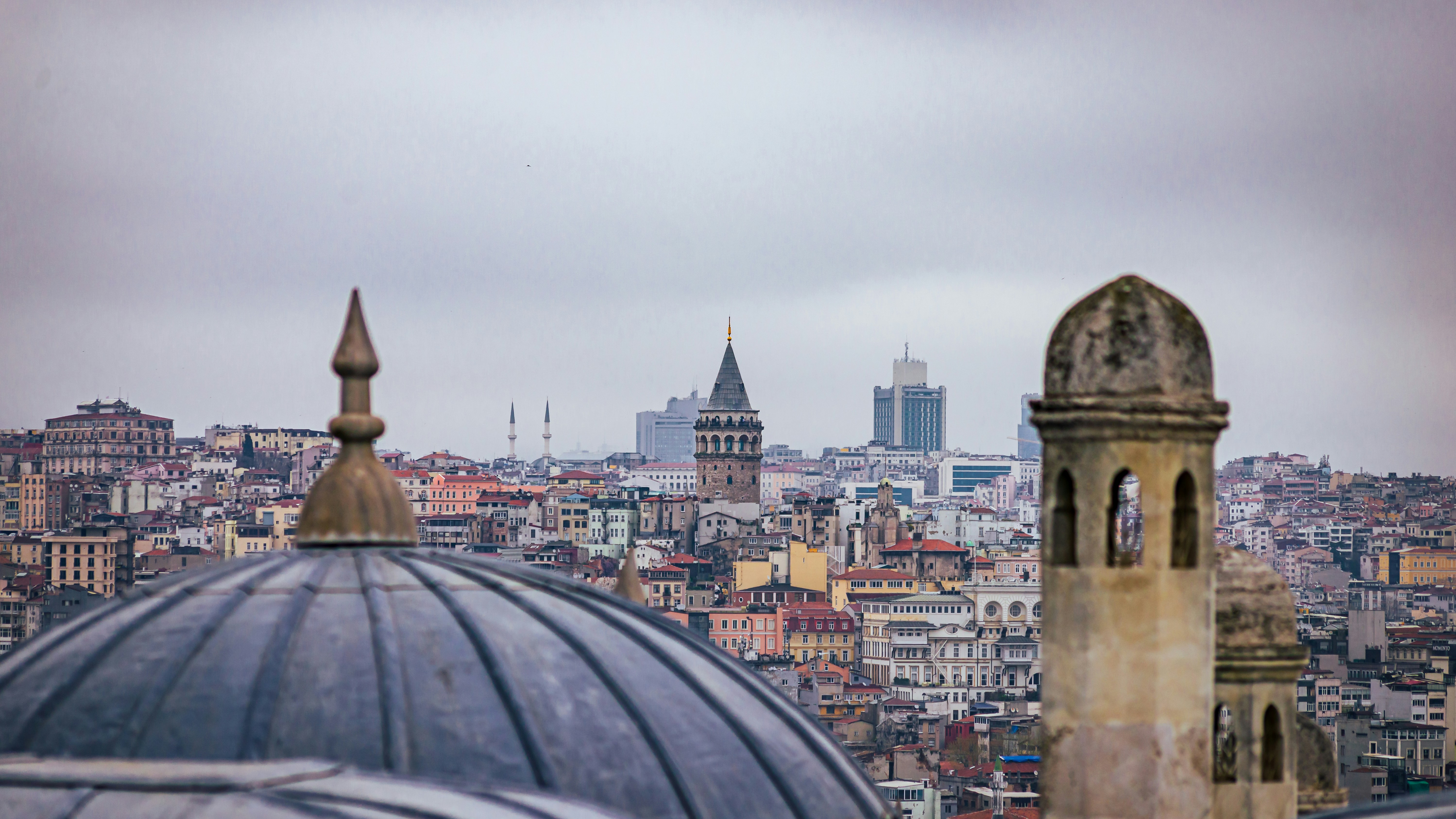 a view of a city from a rooftop of a building