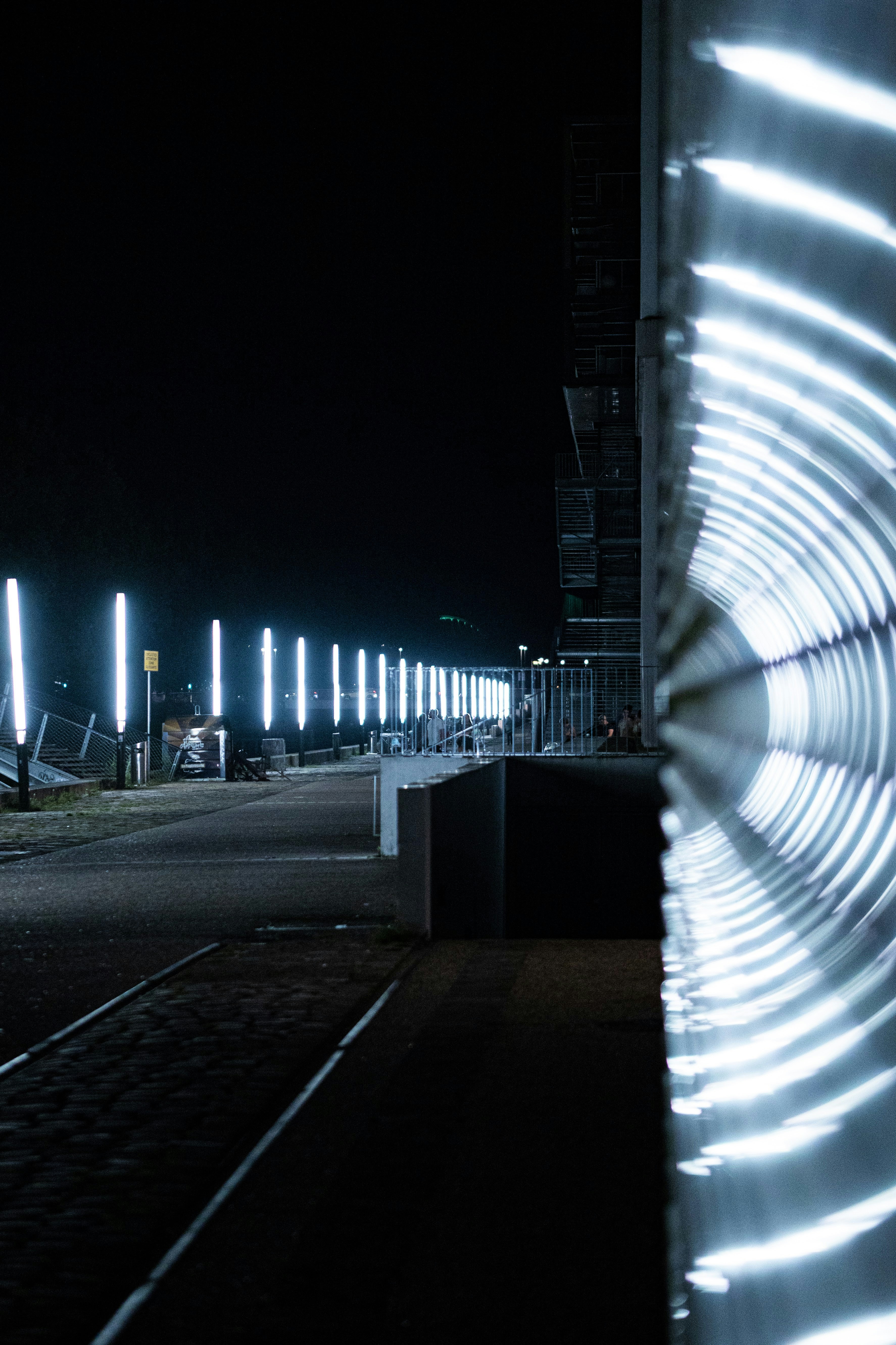 A long exposure of a train track at night photo – Free Night city Image ...