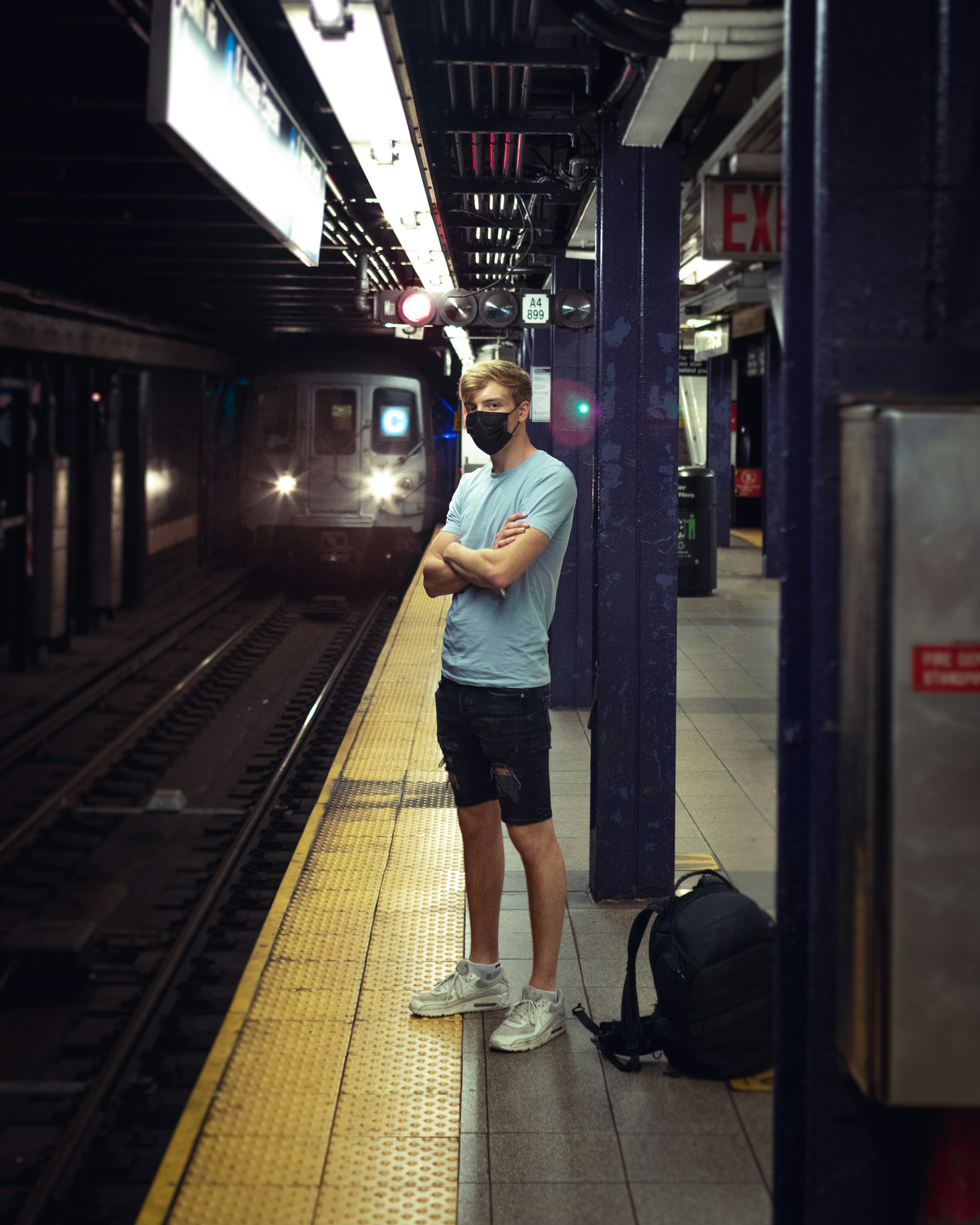 Crossing Gaze: A Quiet Standoff at the Subway Edge