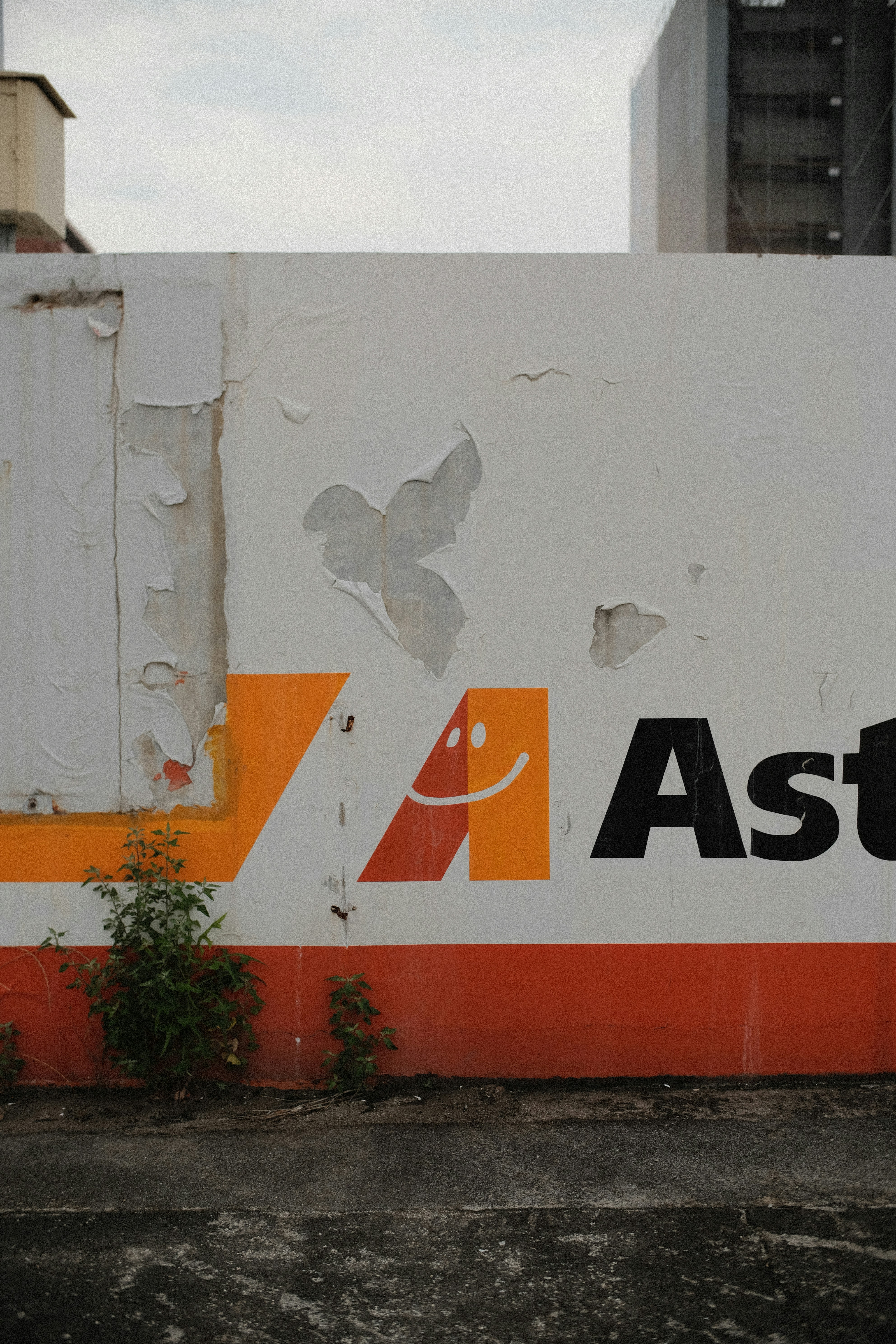 A large advertisement on the side of a building photo – Free Wall Image ...