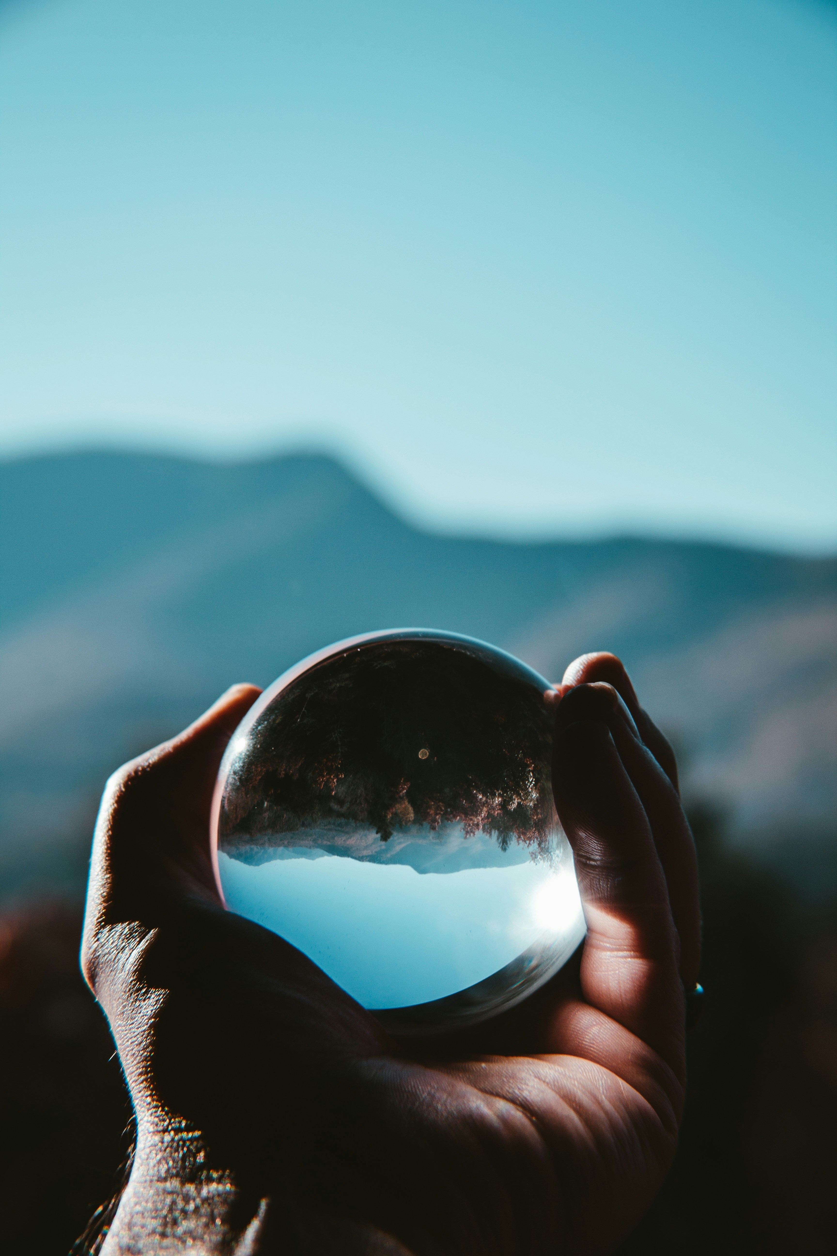 A person holding a crystal ball in their hand photo – Free Appalachian ...