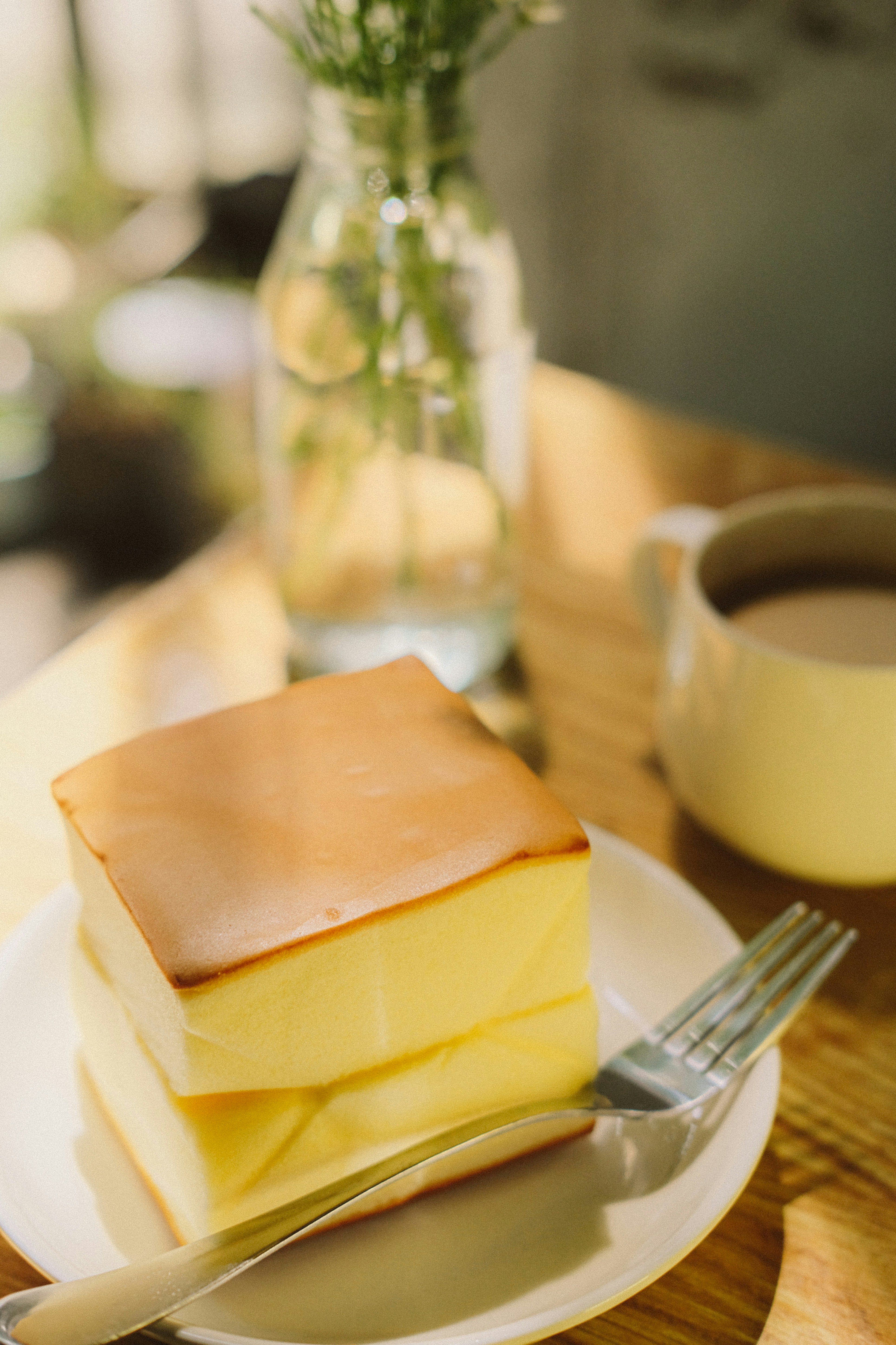 Two-Layer Castella in Soft Morning Light on a Wooden Table