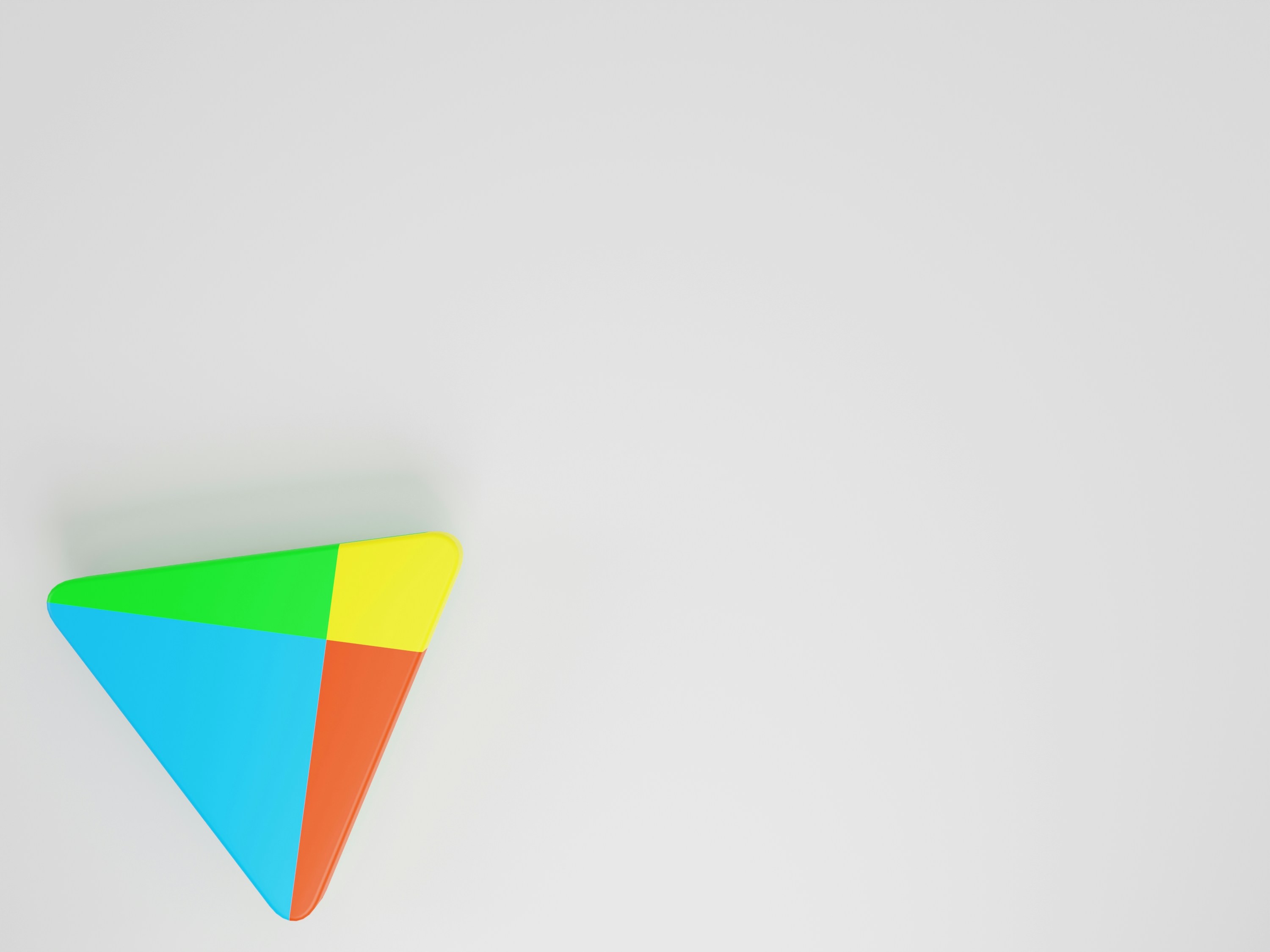 A colorful triangle shaped object on a white background photo – Free 3d ...