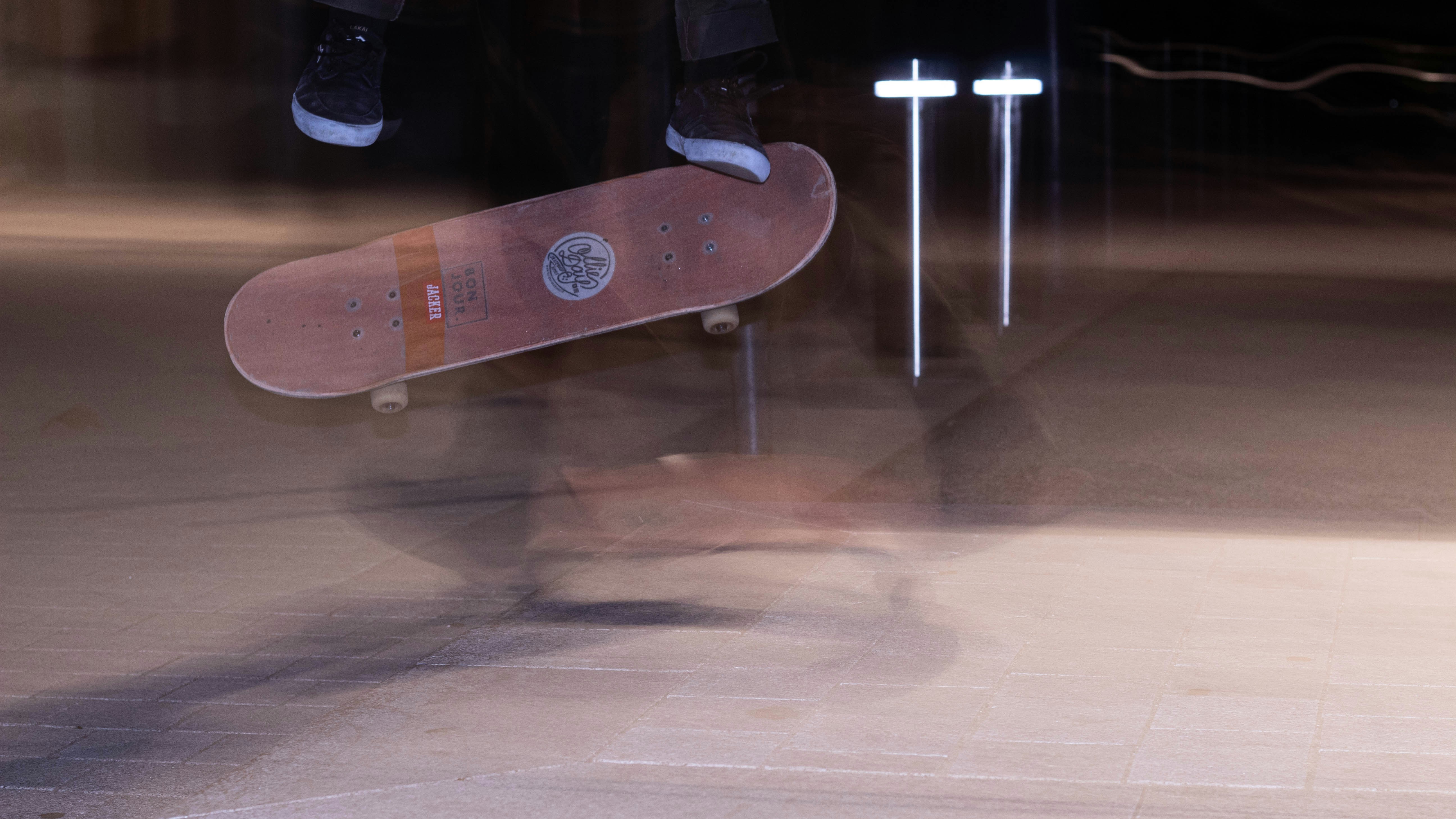 Mid-Air Kickflip Over a Quiet Night Skate Park