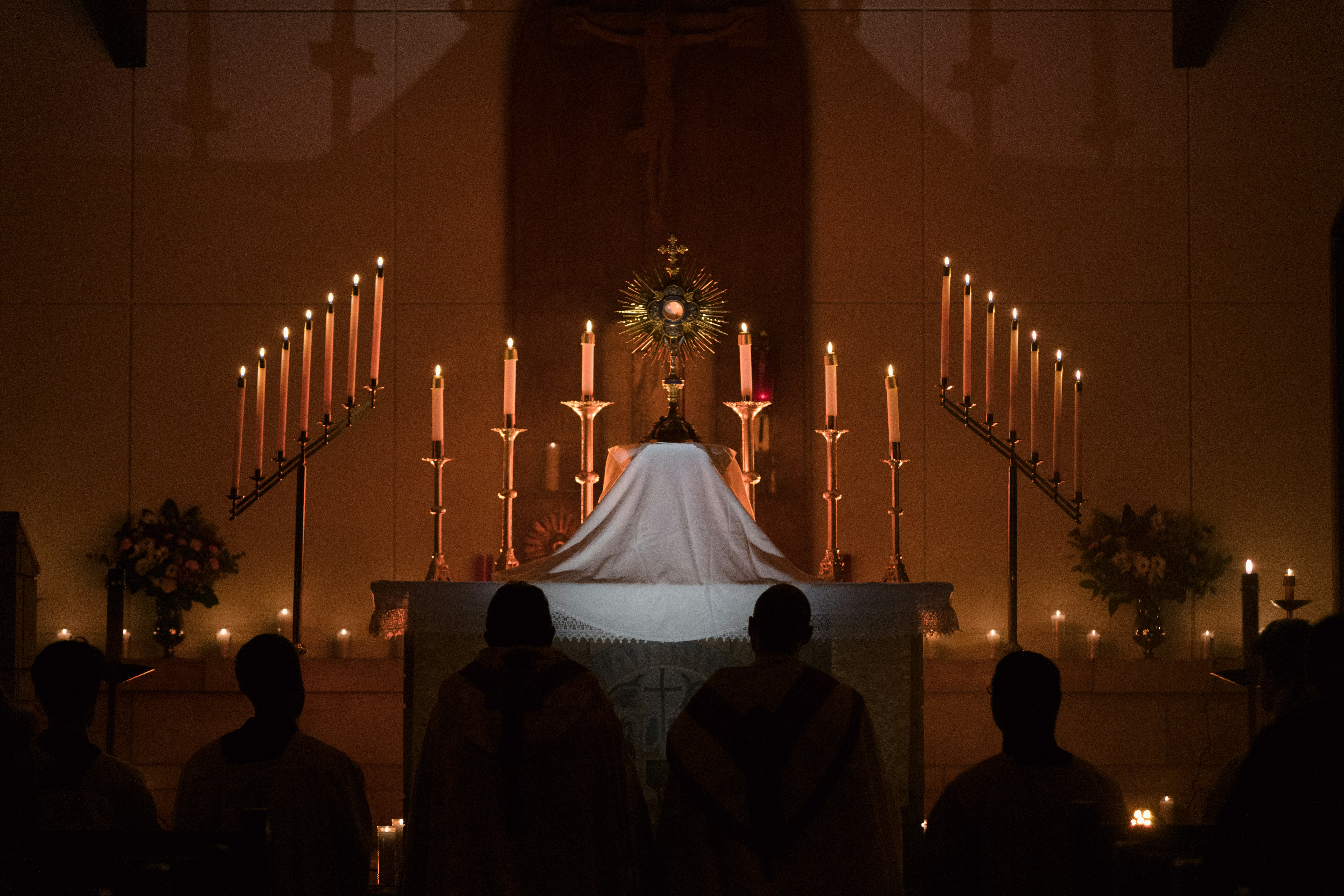 A group of people standing around a church altar photo – Free Brown ...