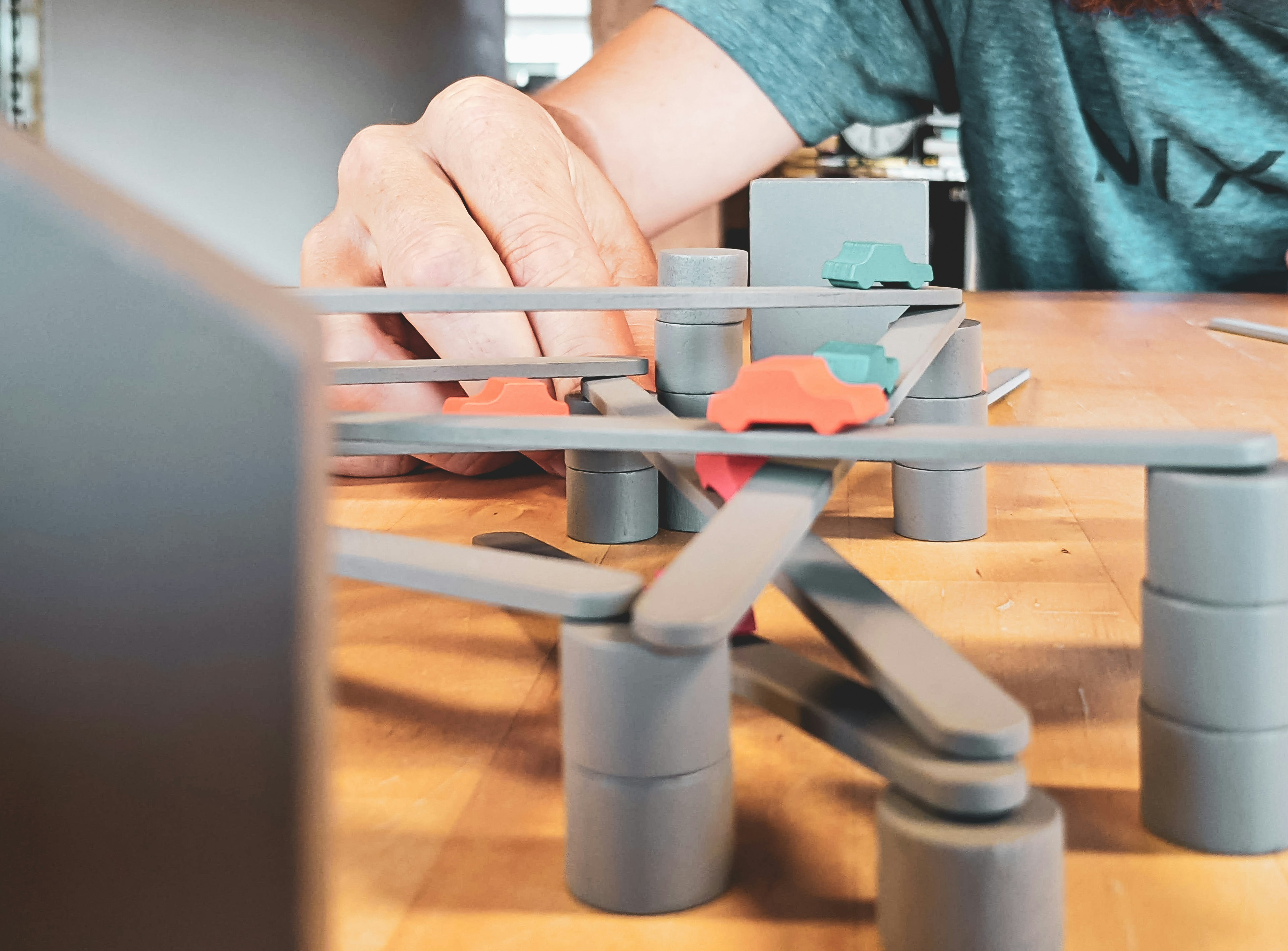 Hands on the Grey Rail Maze: Building a Toy Track on a Wooden Table