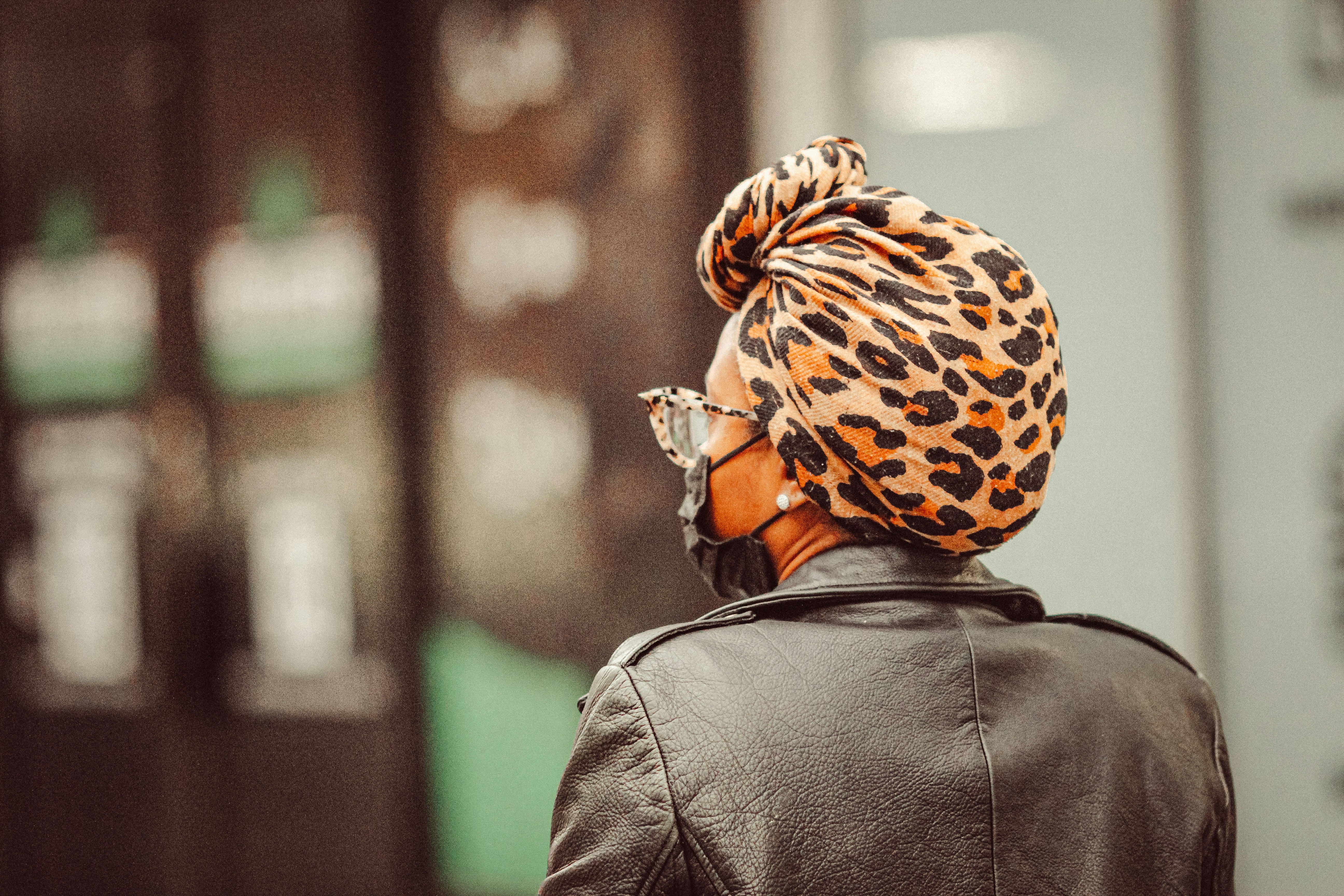 Leopard Turban in the City: A Back-View Portrait of Urban Edge