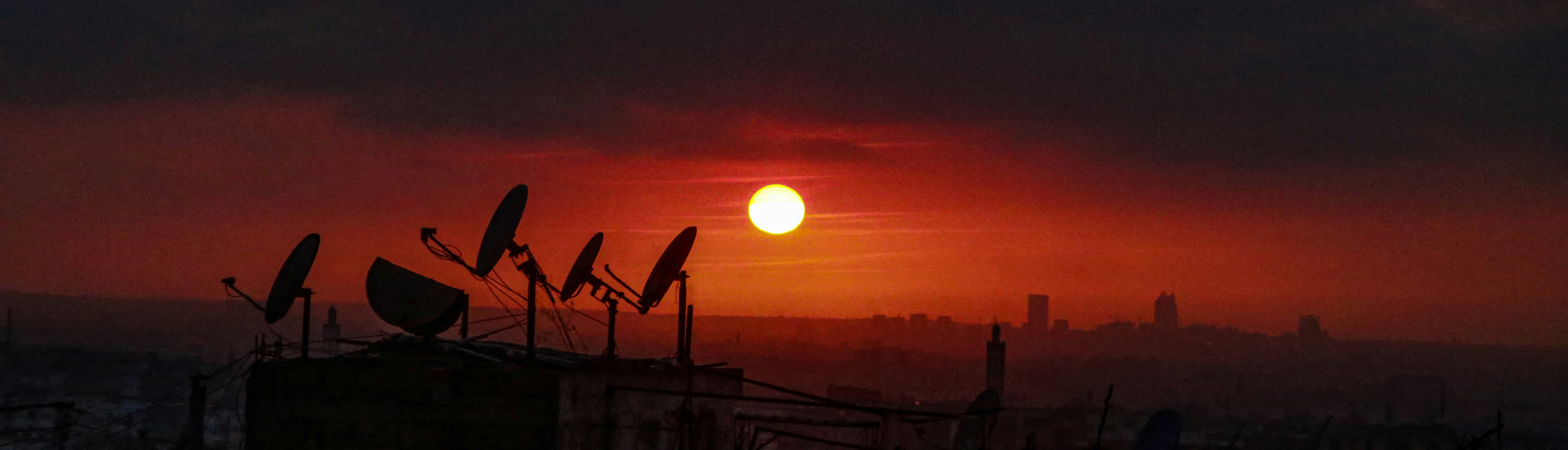 Sunlit Silhouettes Over the Distant Horizon