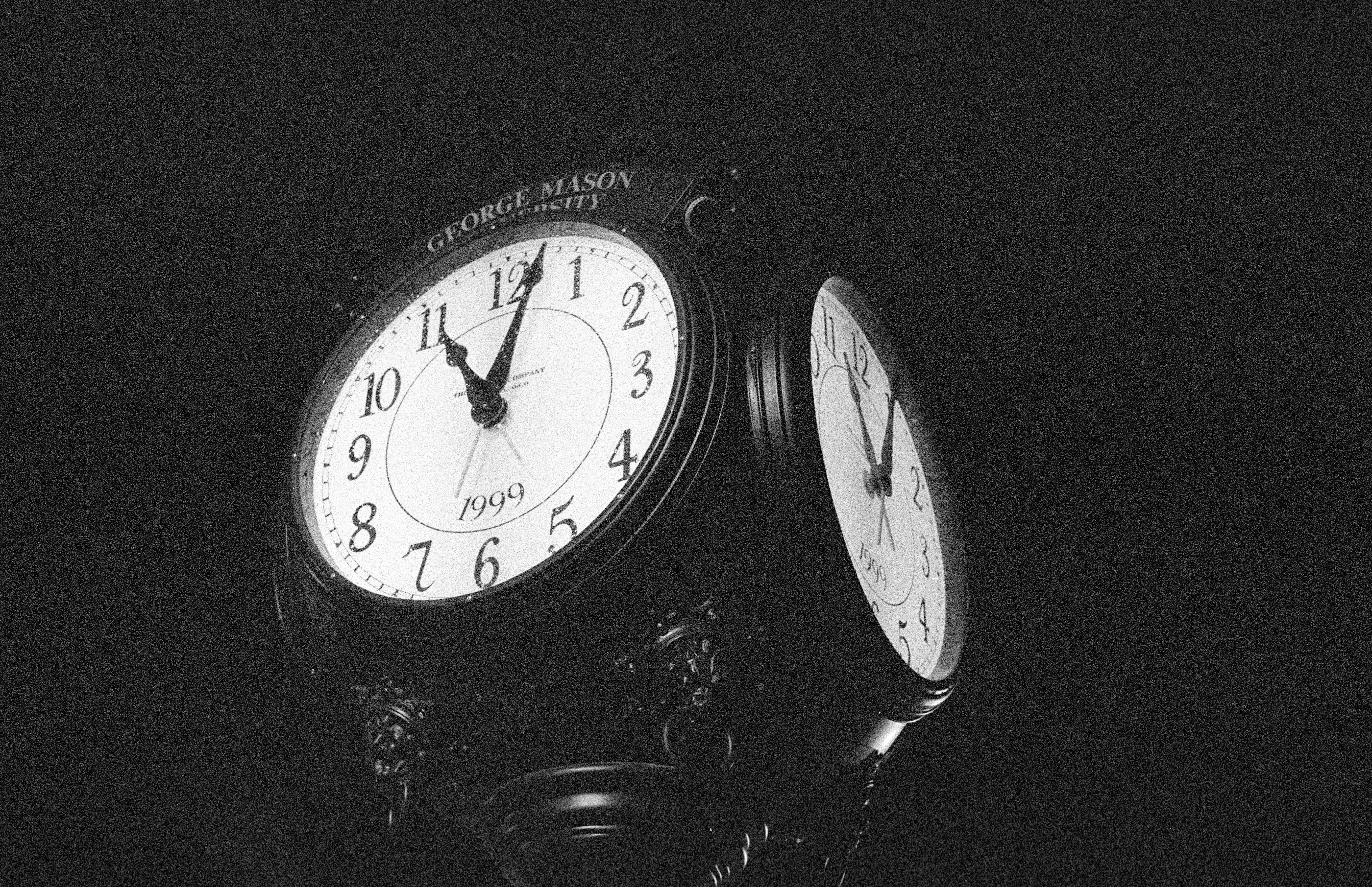 A black and white photo of two clocks photo – Free George mason ...