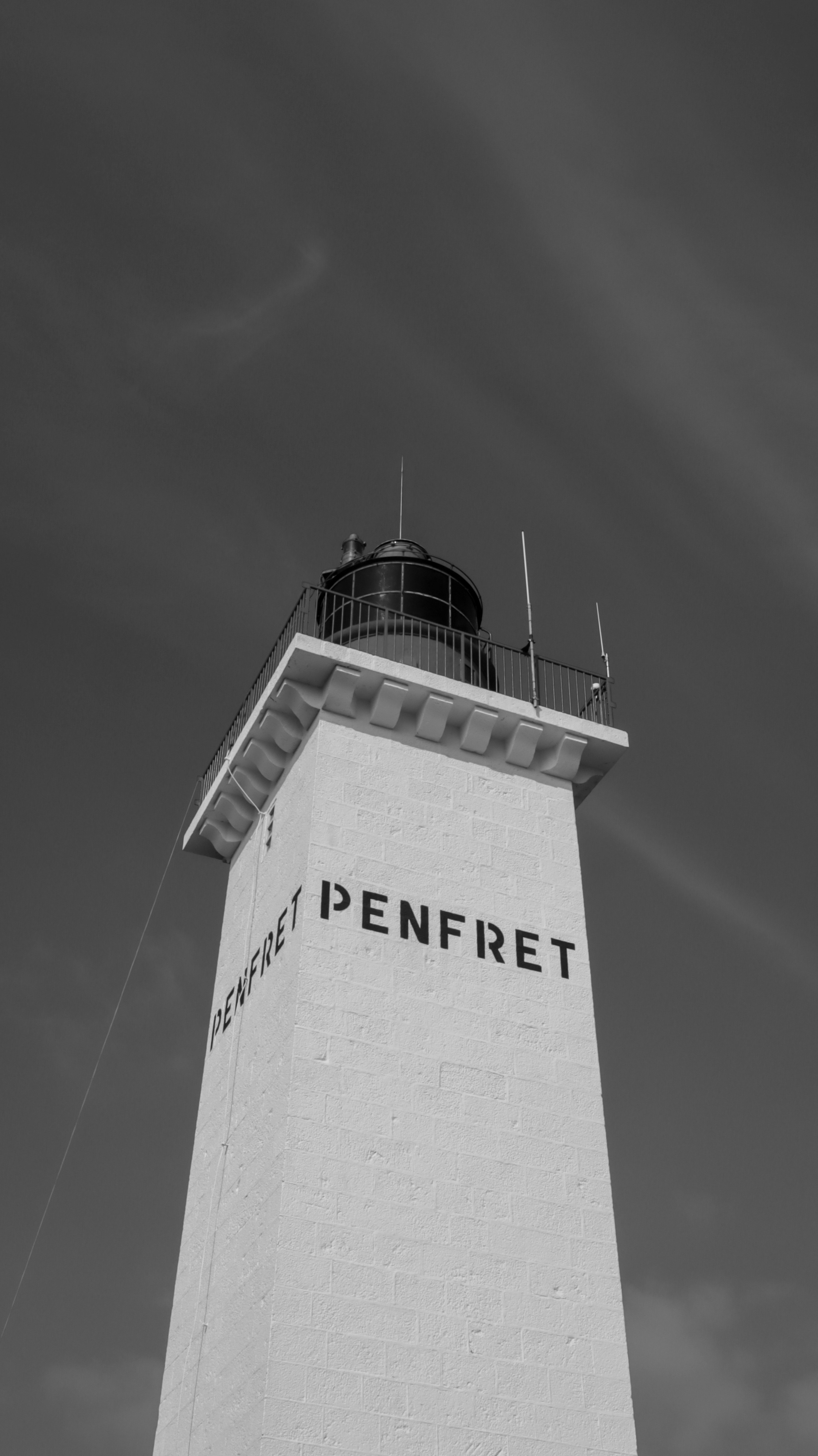 Penfret's Mono Sentinel: A Tall Lighthouse Reaching into the Sky