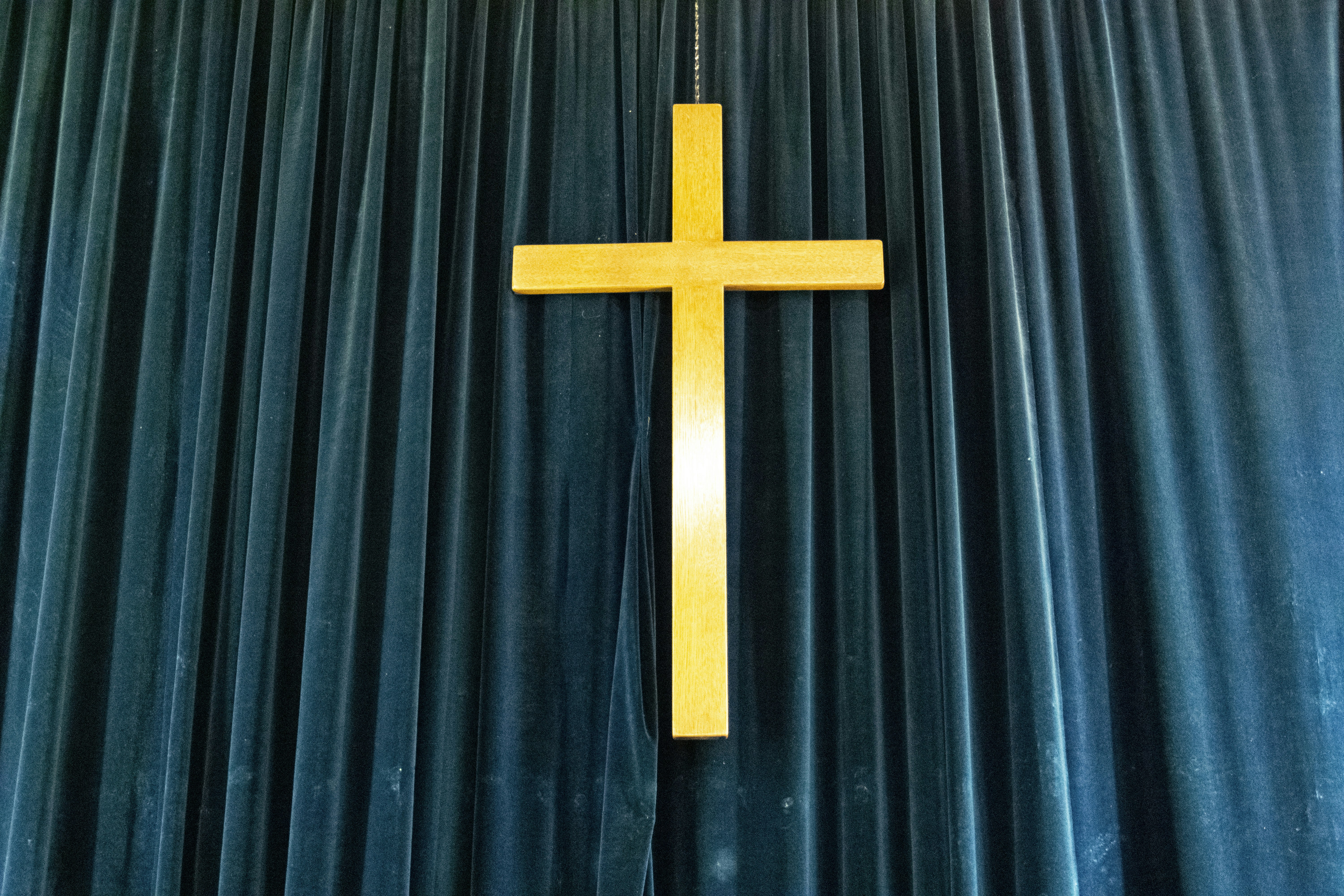 A cross hanging from the side of a curtain photo – Free Mosgiel Image ...