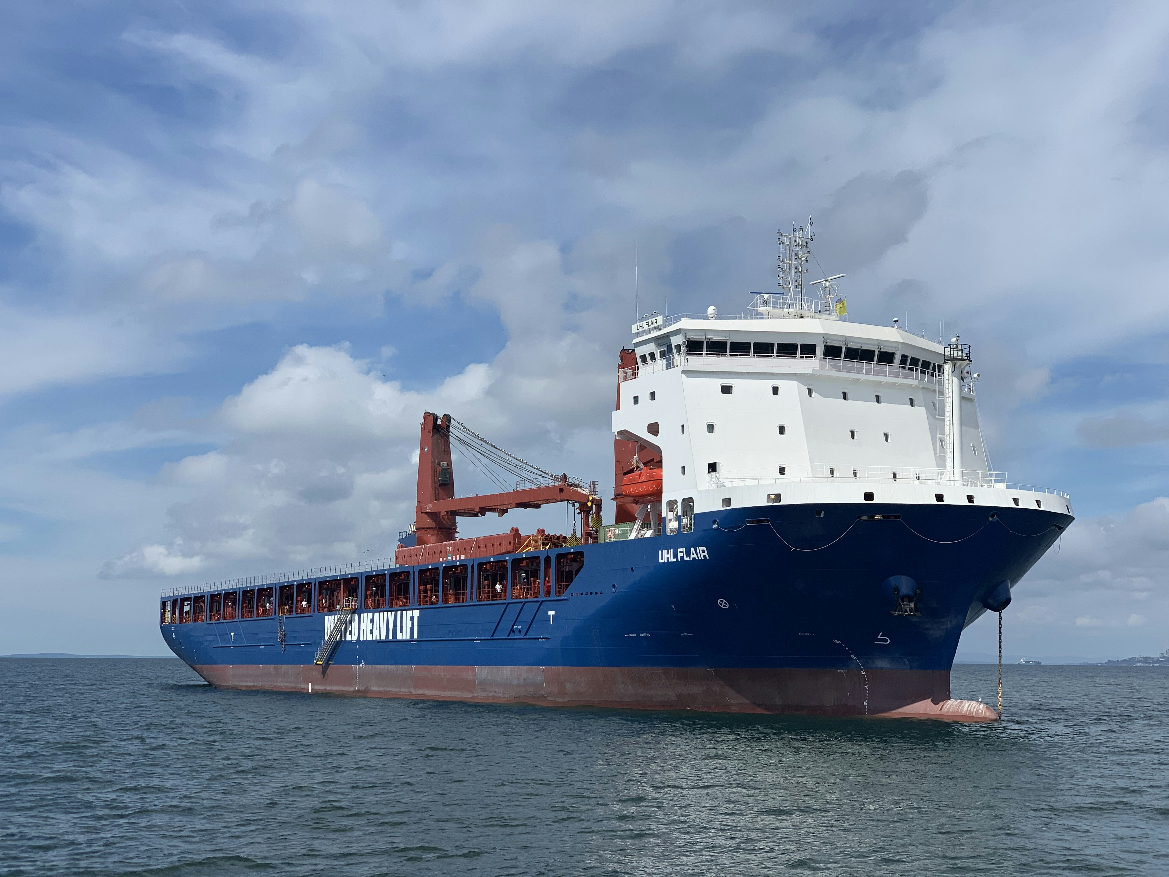 A large boat floating on top of a body of water photo – Free Boat Image ...