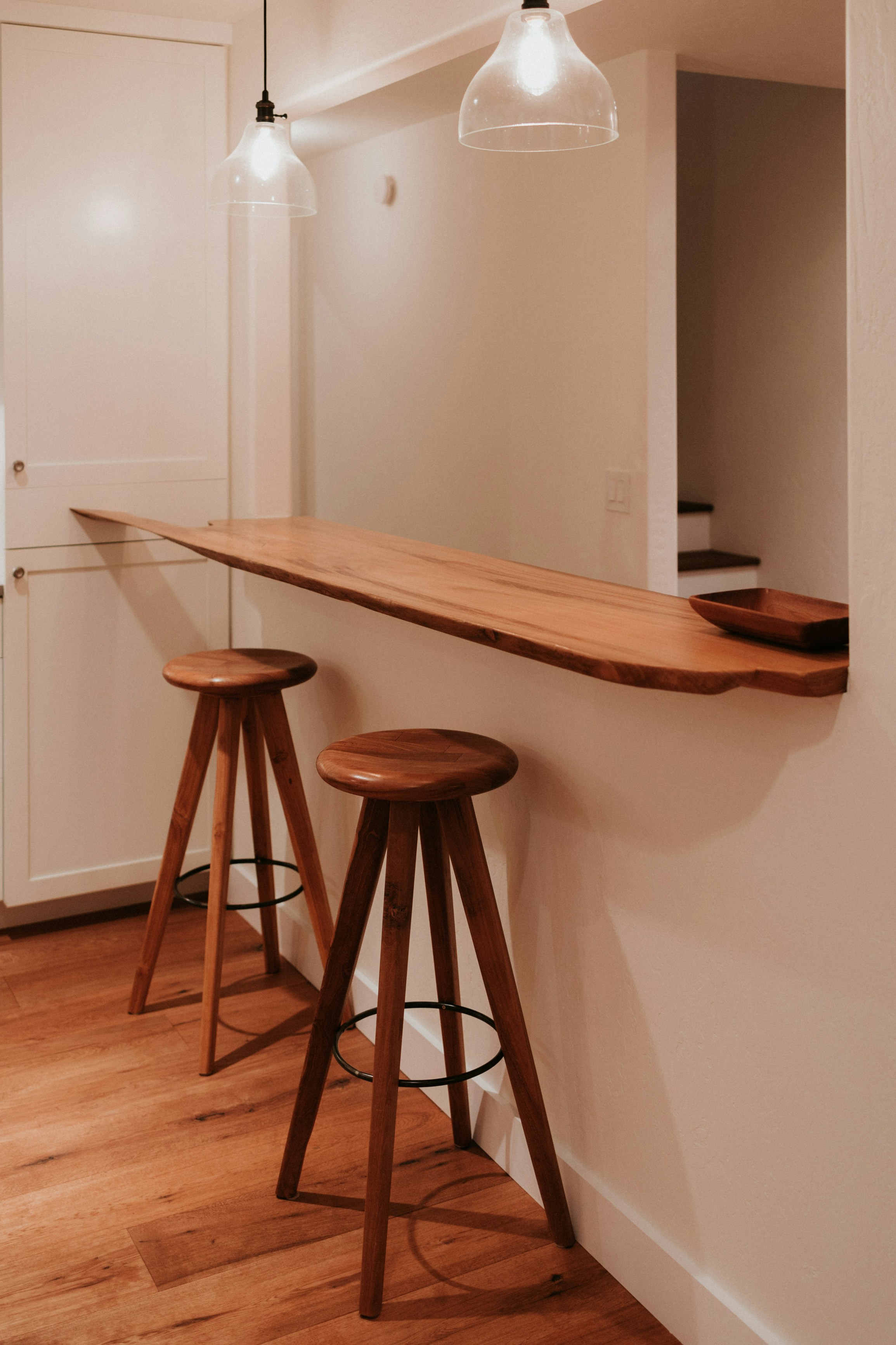 A kitchen with two stools next to a counter photo – Free Real estate ...