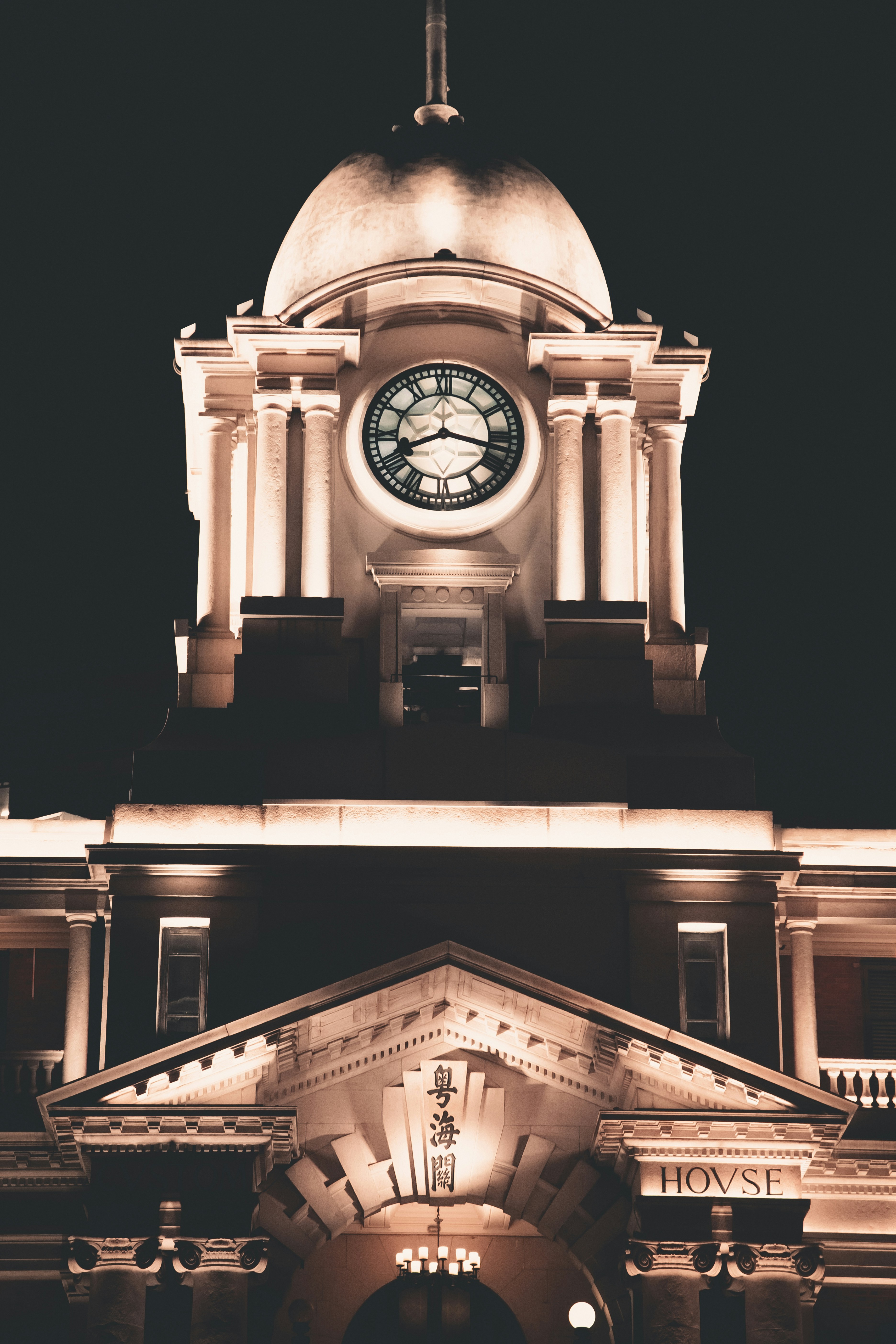 a building with a clock on the top of it