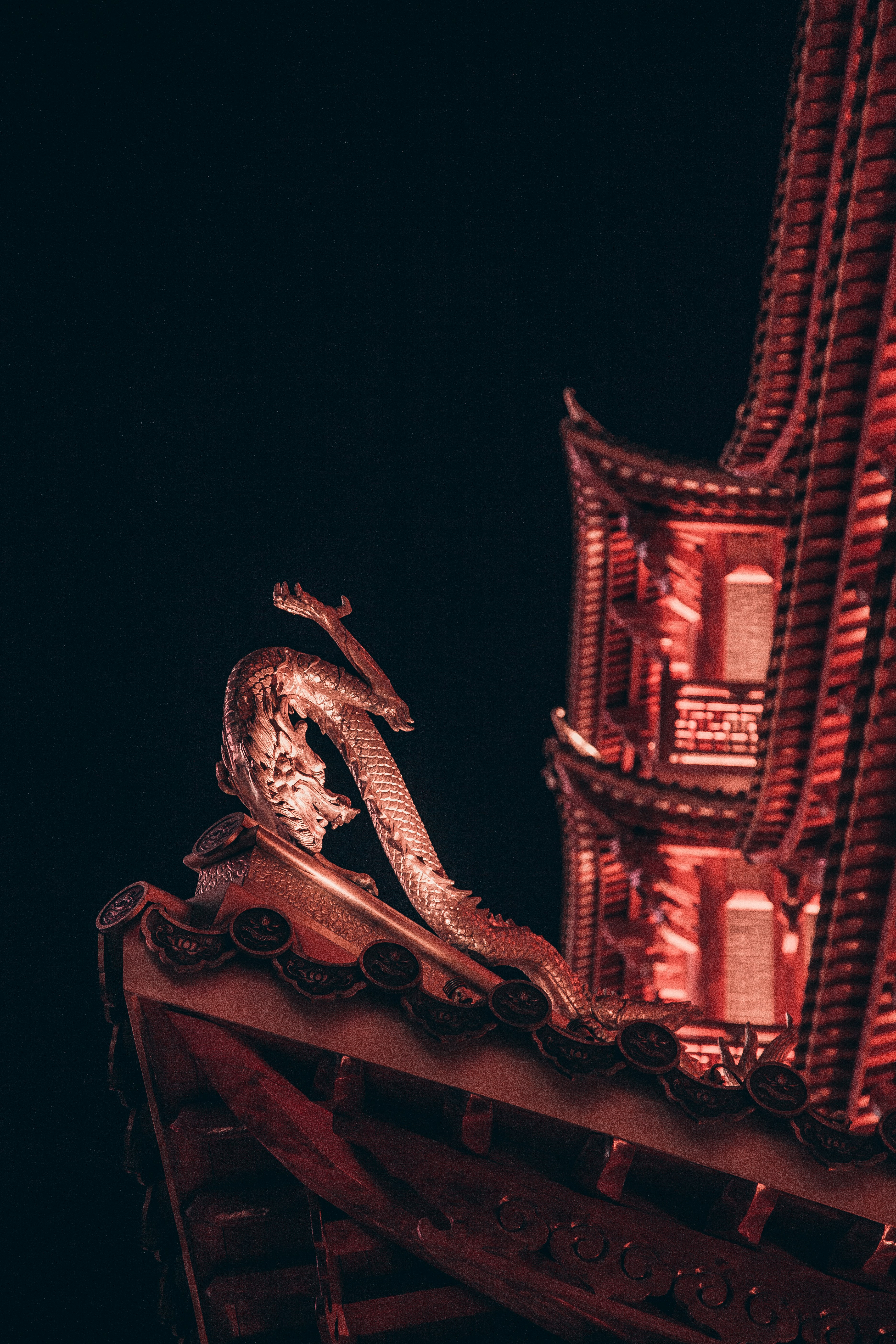 Crimson Guardian on the Temple Roof: Dragon Against Night-lit Eaves